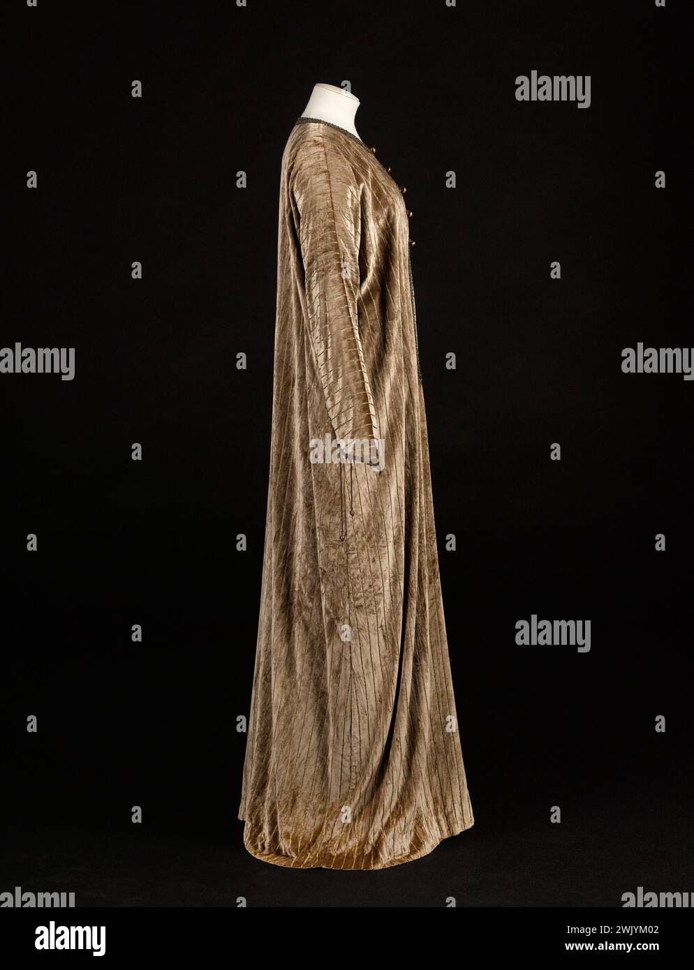 Babani. Interior dress. Taupe silk velvet flap of gold metal wire rays ...