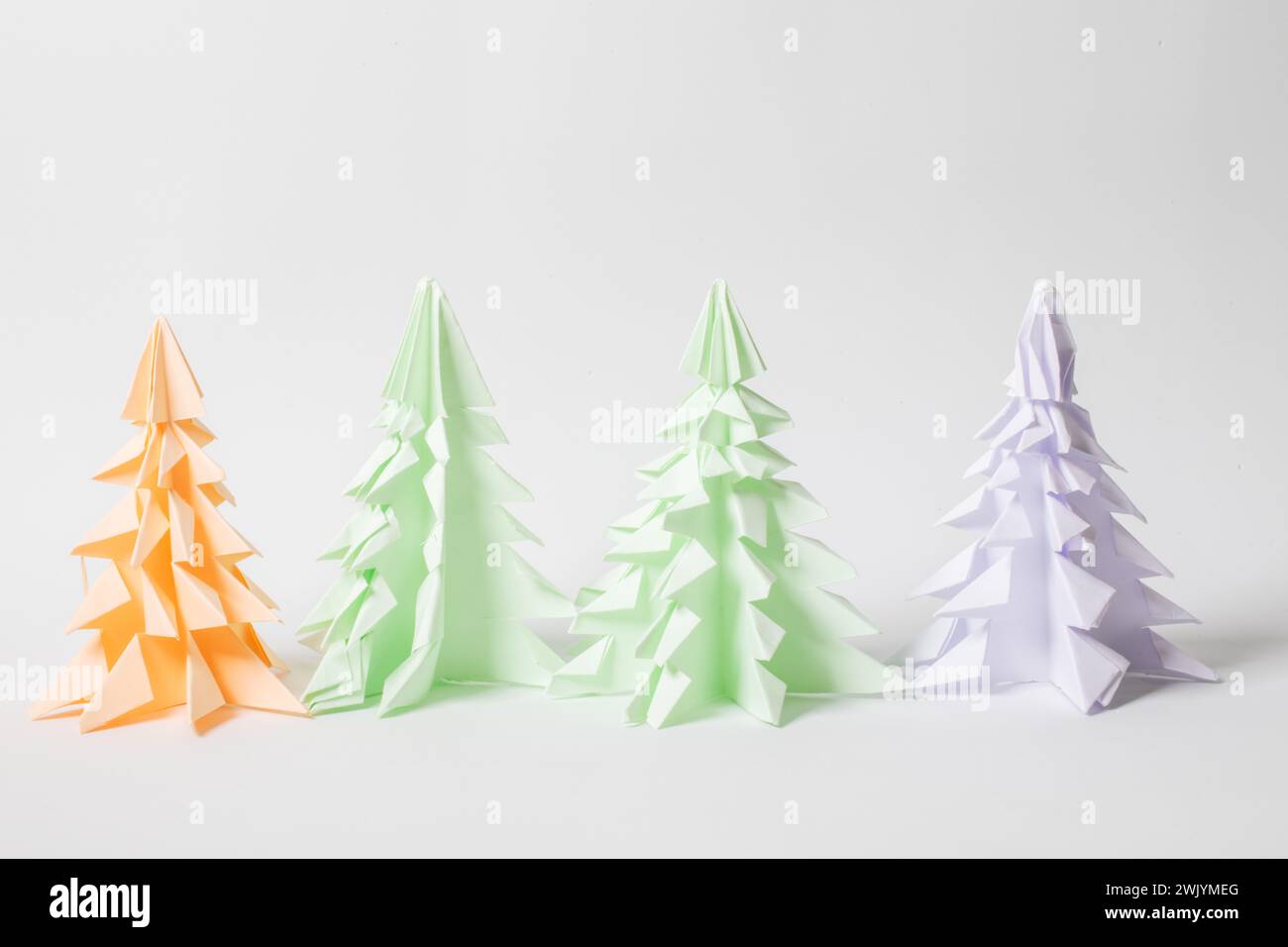 Paper spruce trees isolated on the white background. Concept of forest ...