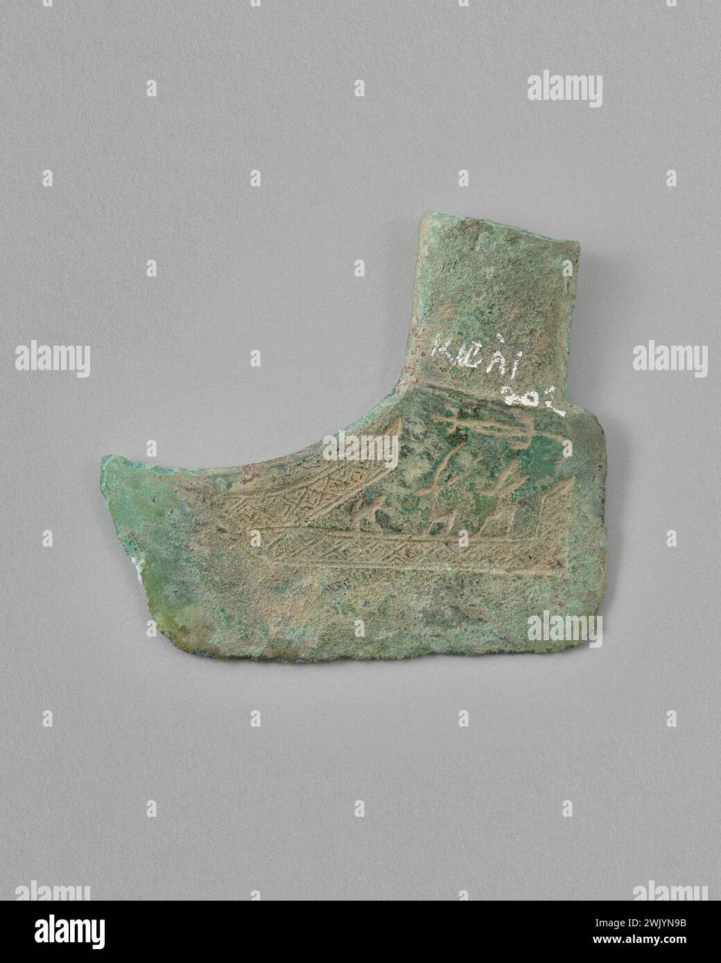 Pediform ax blade. Bronze. Cernuschi Museum, Asia Museum of Asia in the ...
