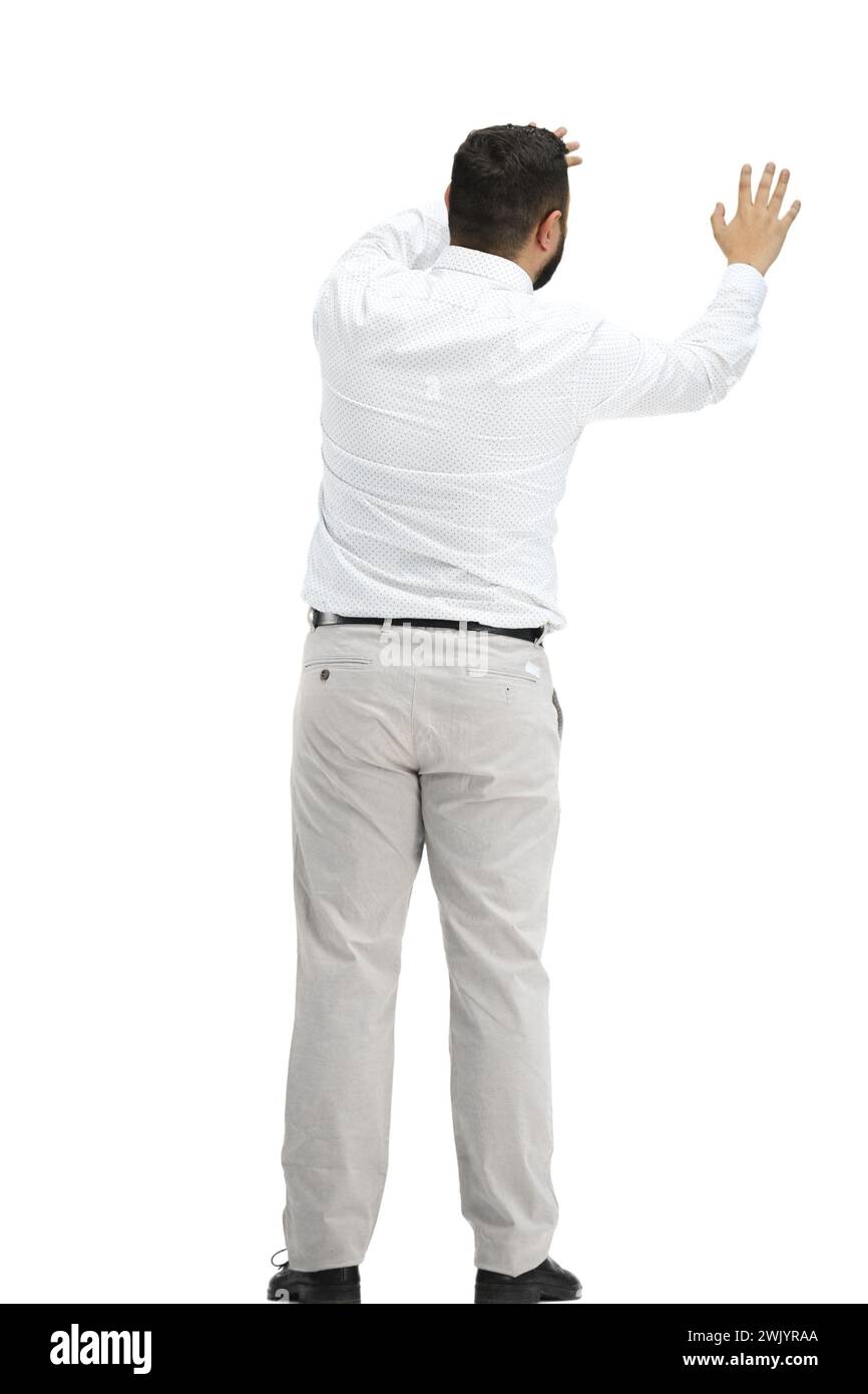 A man, full-length, on a white background, waving his arms Stock Photo ...
