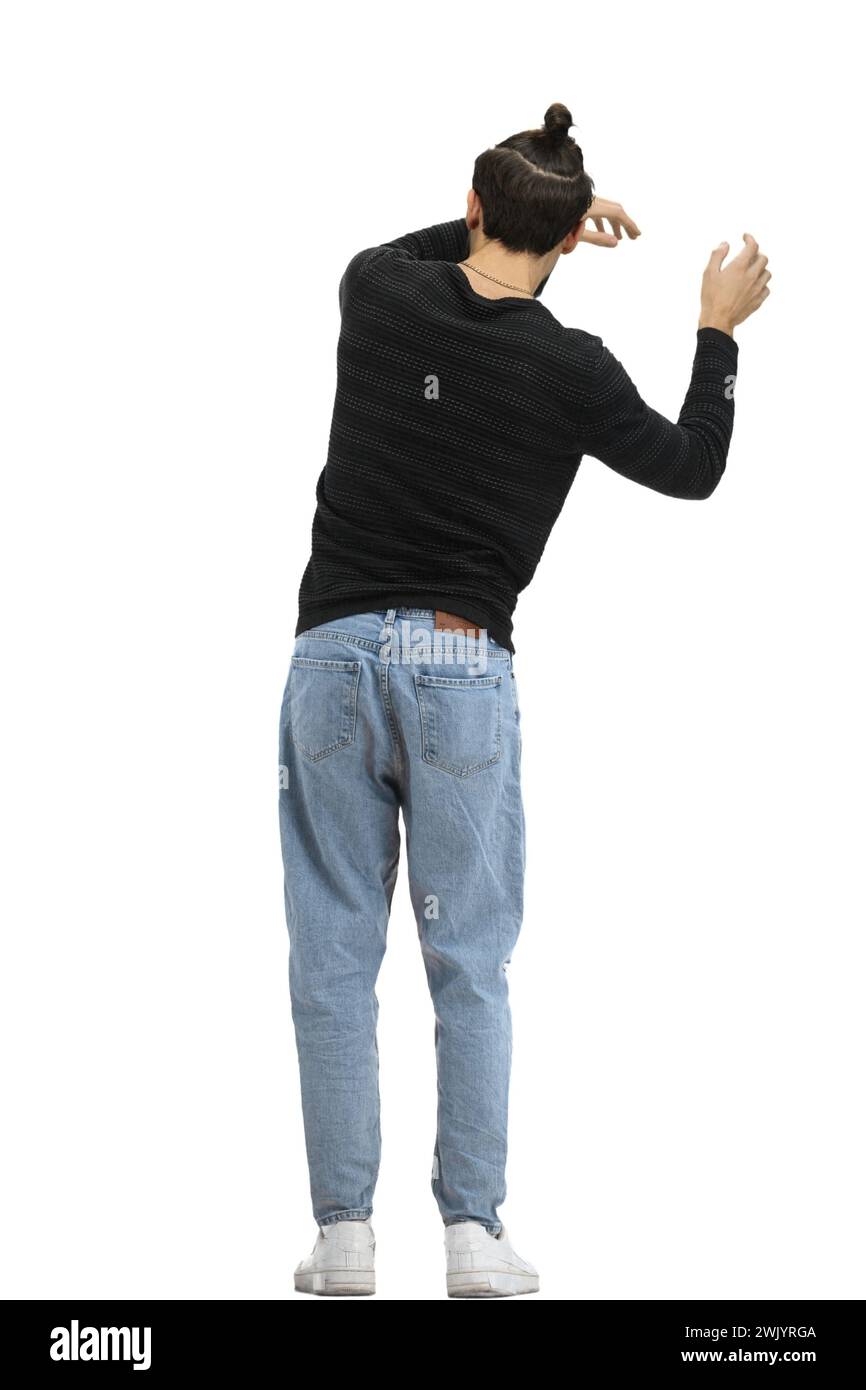A man, full-length, on a white background, waving his arms Stock Photo ...