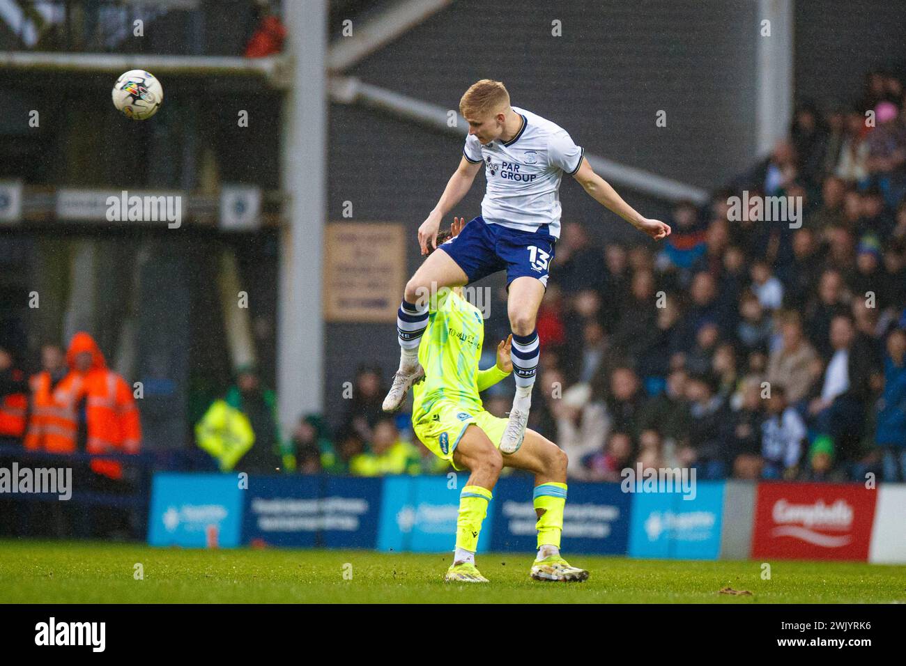 Ali McCann #13 of Preston North End heads the ball during the Sky Bet ...