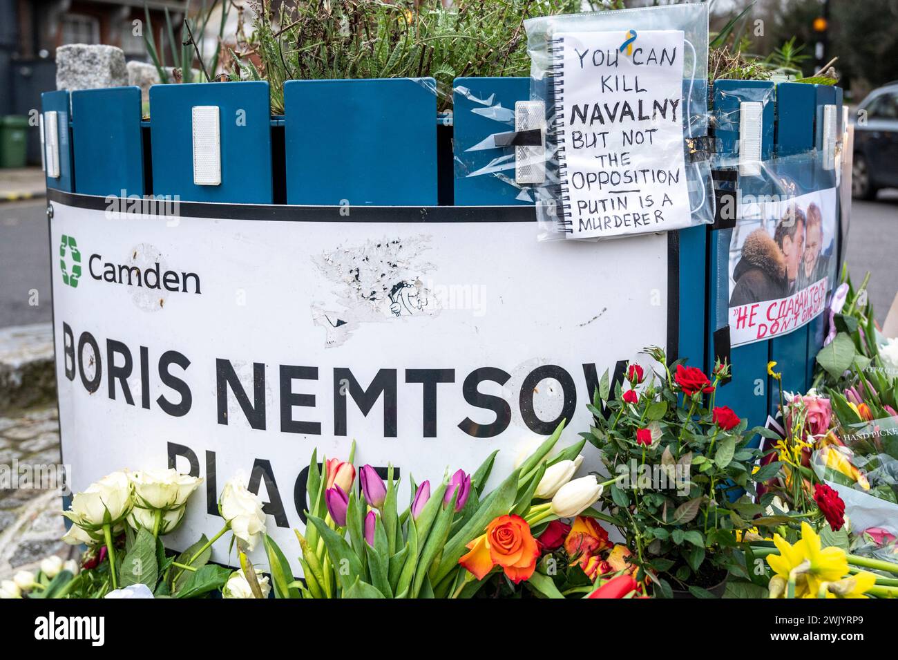 A shrine to Alexei Navalny at Boris Nemstov Place, London with flowers ...