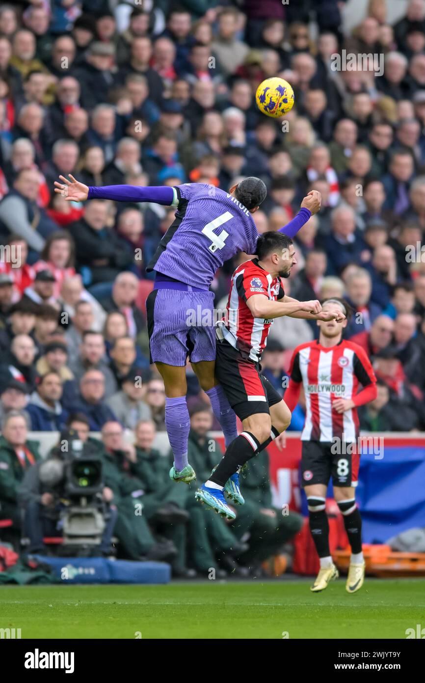 Virgil van Dijk of Liverpool FC rises to head the high ball during the ...