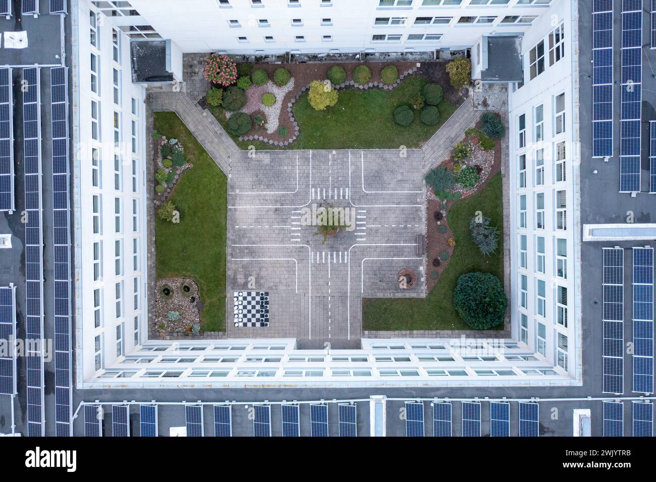 Drone photography of school building with solar panels on rooftop ...