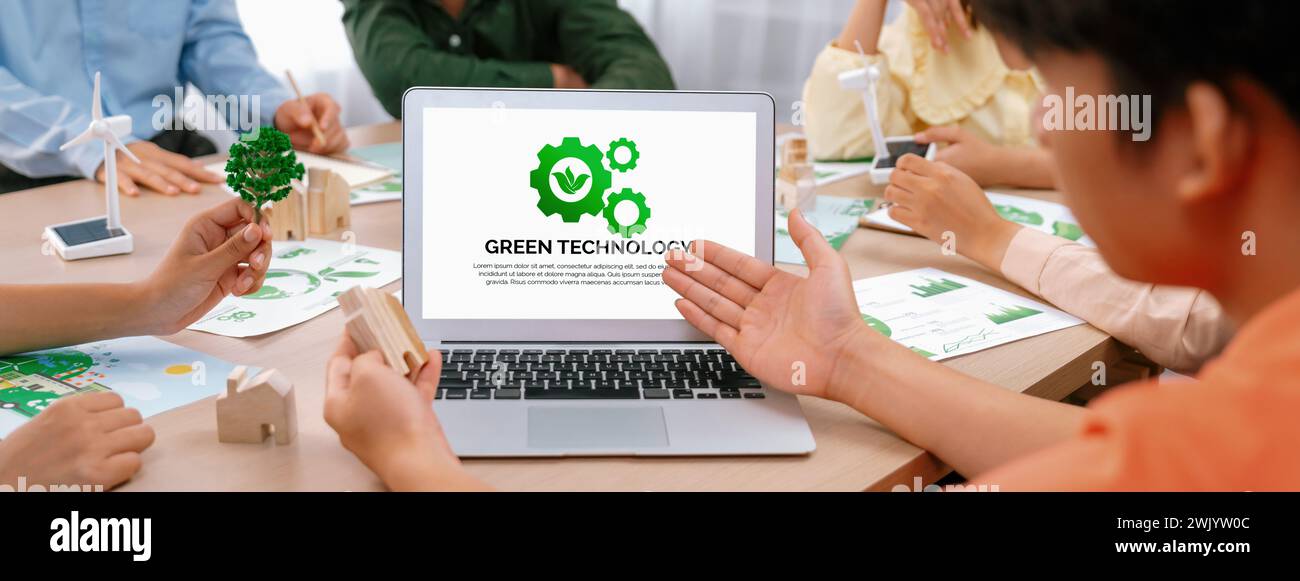 Green technology logo displayed on green business laptop while business ...