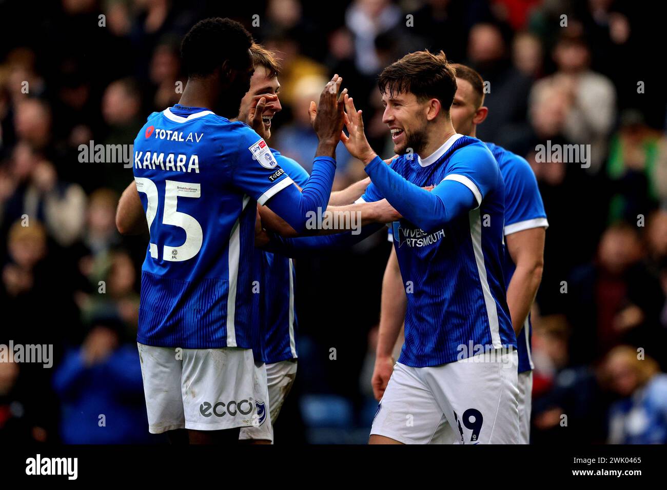 Portsmouth's Callum Lang celebrates after scoring their third goal with ...