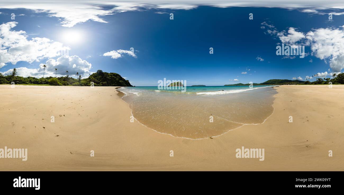 Sandy beach with ocean waves, blue sky and clouds. Nacpan Beach. El ...