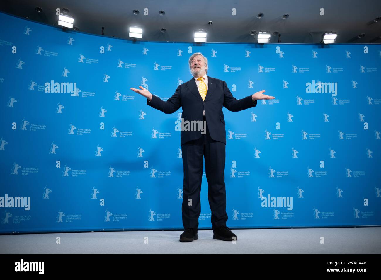 Berlin, Germany. 17th Feb, 2024. Stephen Fry, actor, gestures during ...