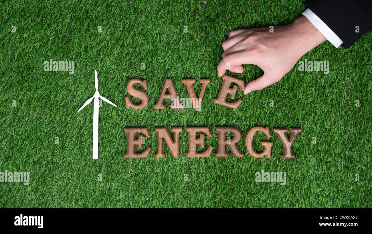 Hand arrange wooden alphabet in ECO awareness campaign on biophilia ...