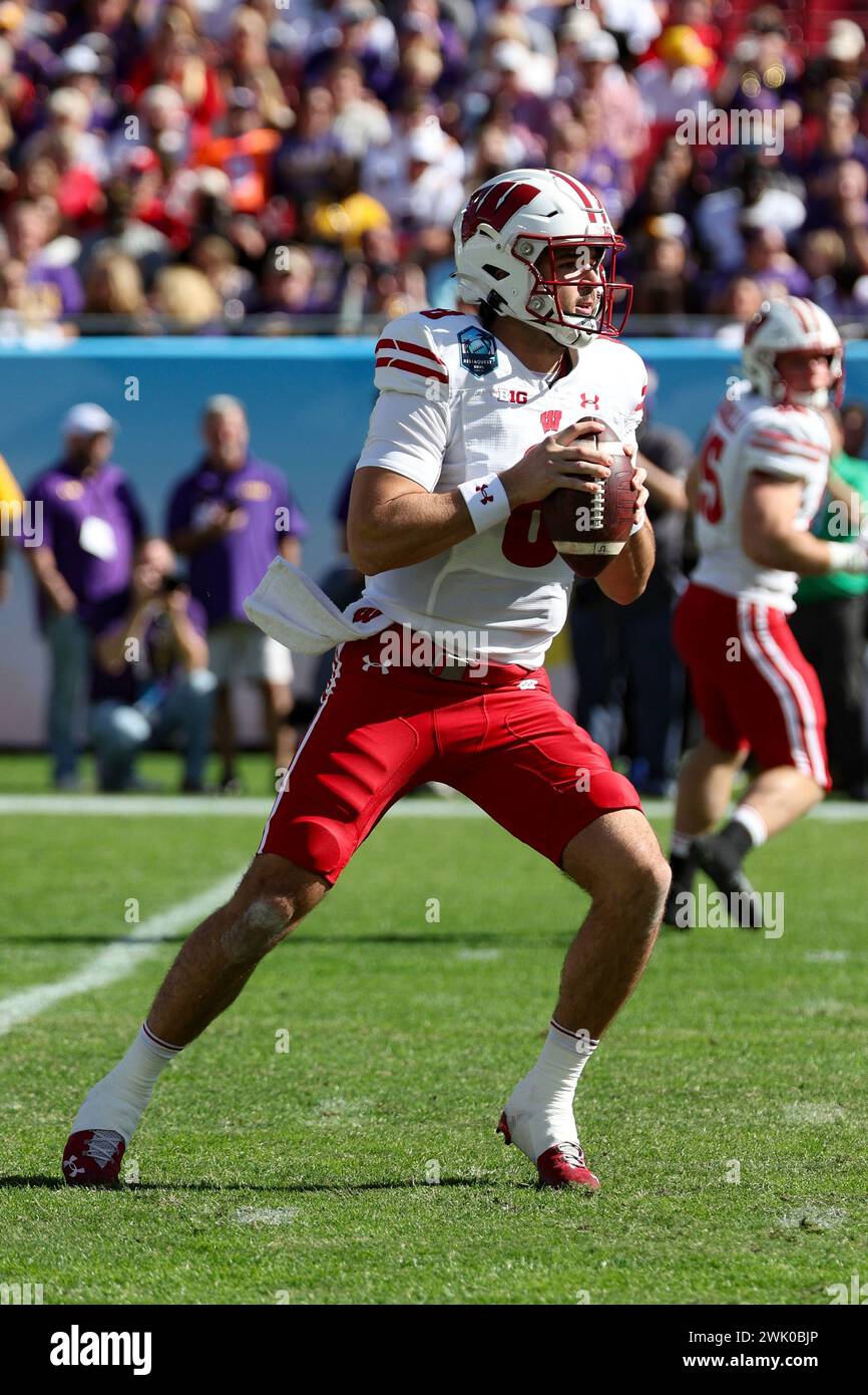 Wisconsin Badgers quarterback Tanner Mordecai (8) looks downfield for a ...