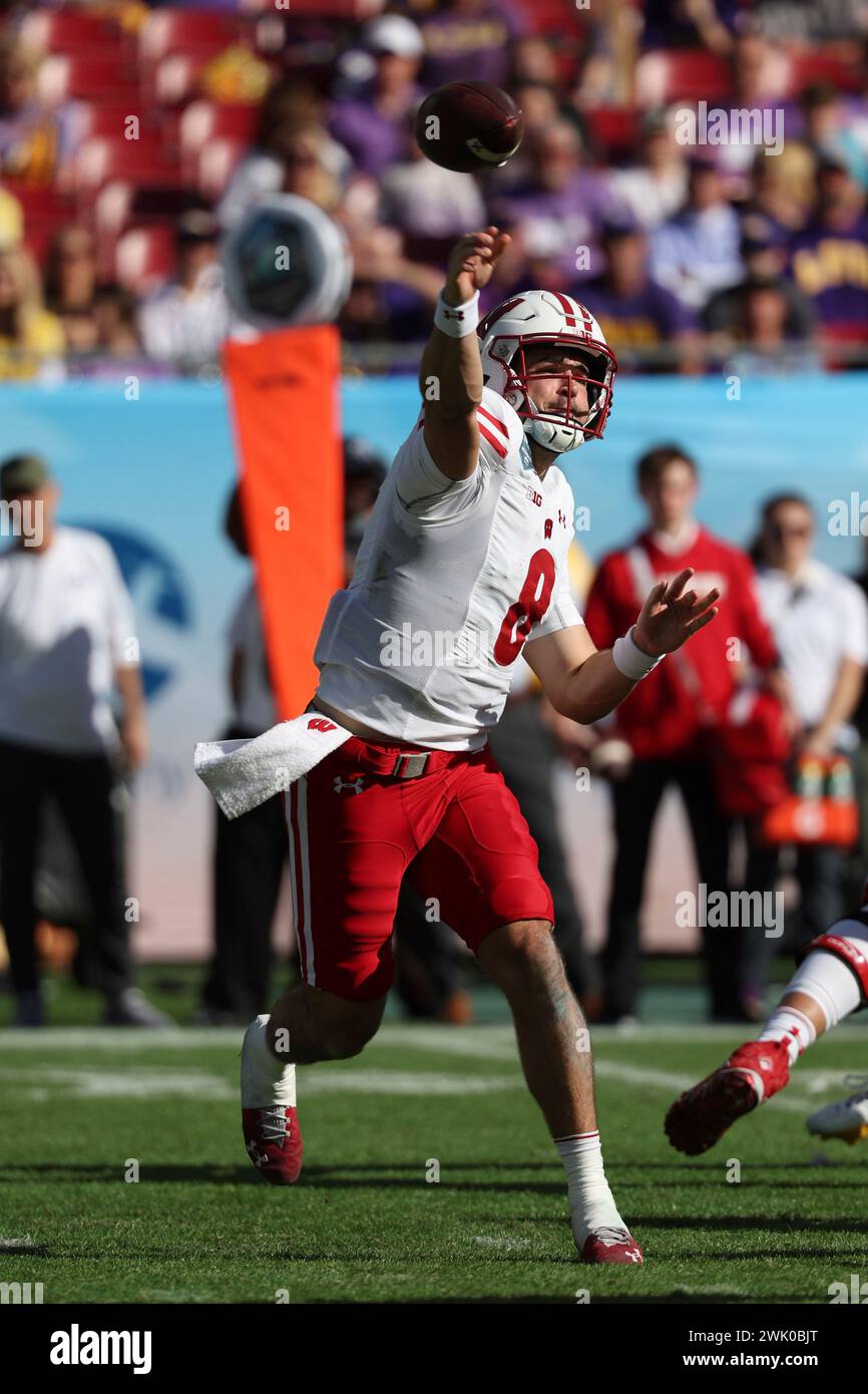 Wisconsin Badgers quarterback Tanner Mordecai (8) passes the ball in ... Wisconsin Badgers quarterback Tanner Mordecai (8) passes the ball in ...
