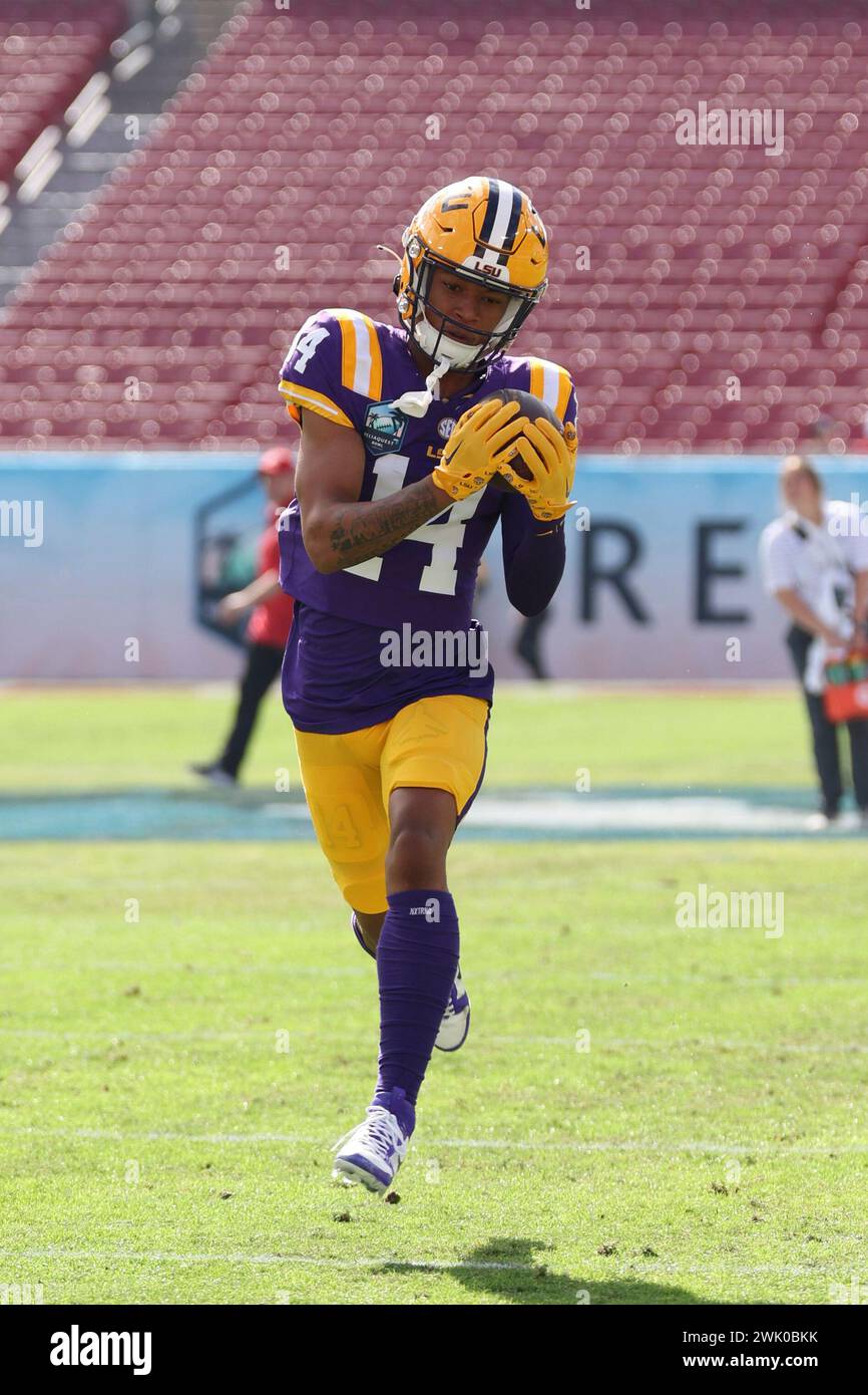 LSU Tigers wide receiver Jalen Brown (14) catches a pass during warm ...