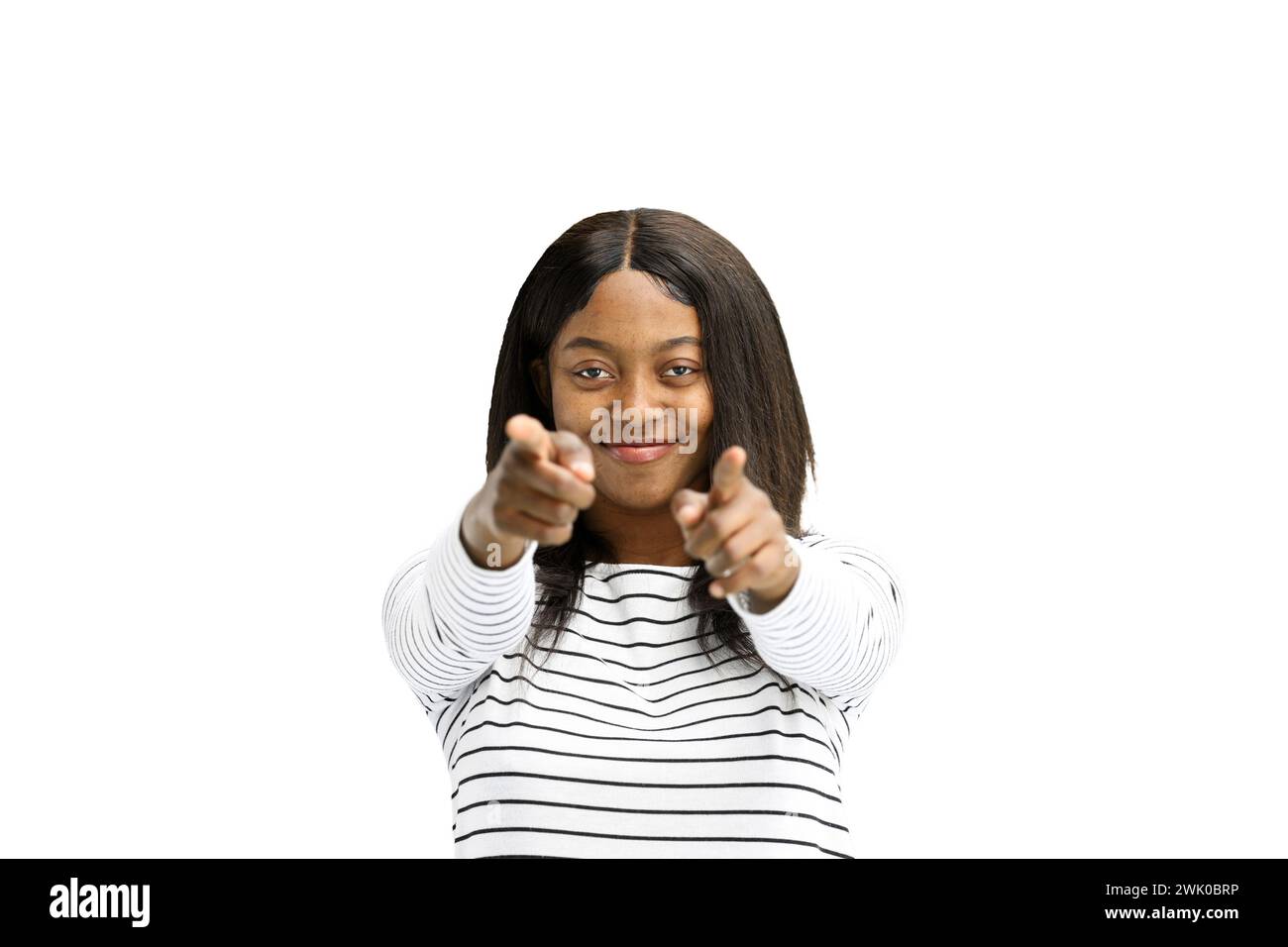 A woman, on a white background, in close-up, points forward Stock Photo ...
