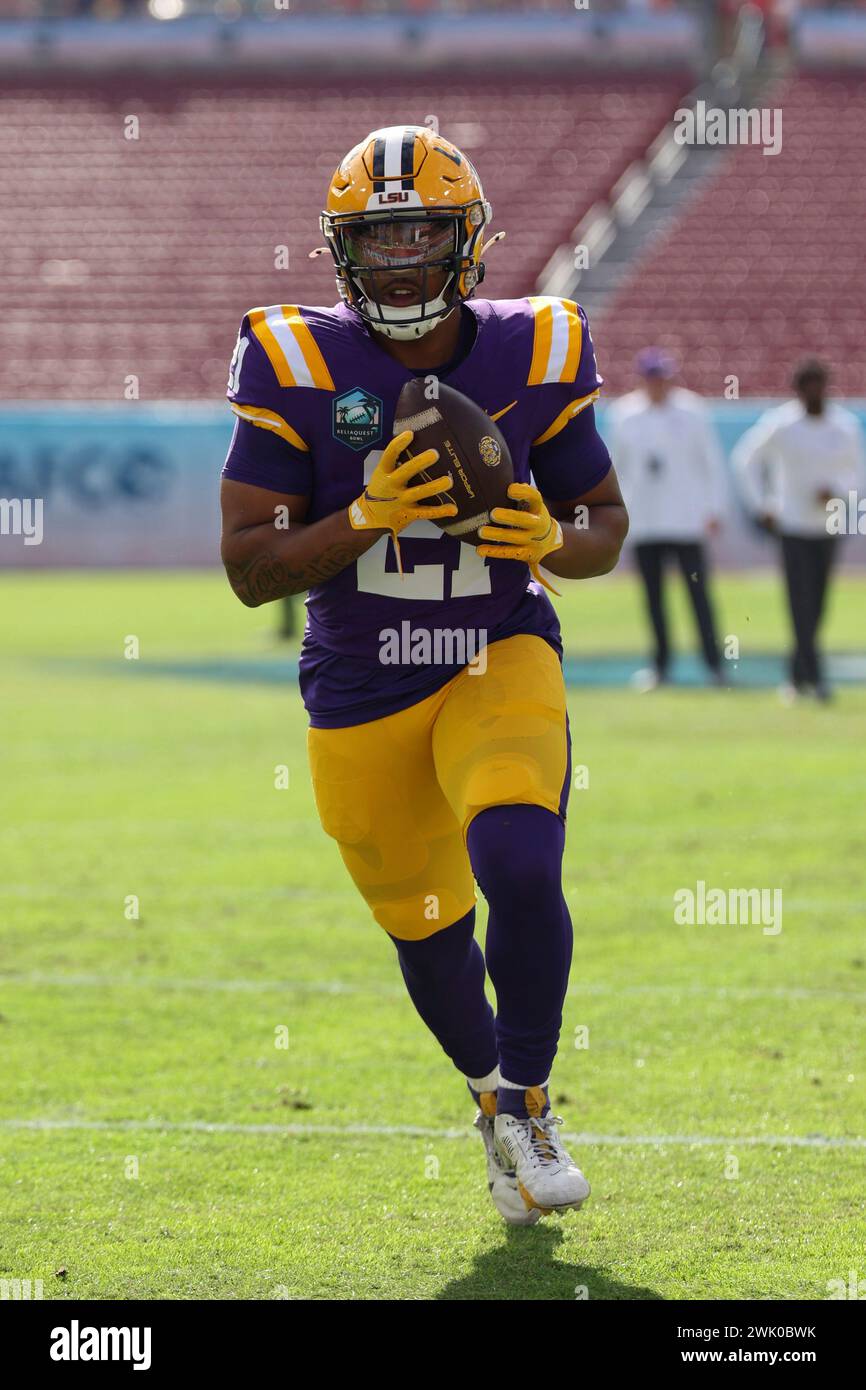 LSU Tigers running back Noah Cain (21) carries the ball during warm-ups ...