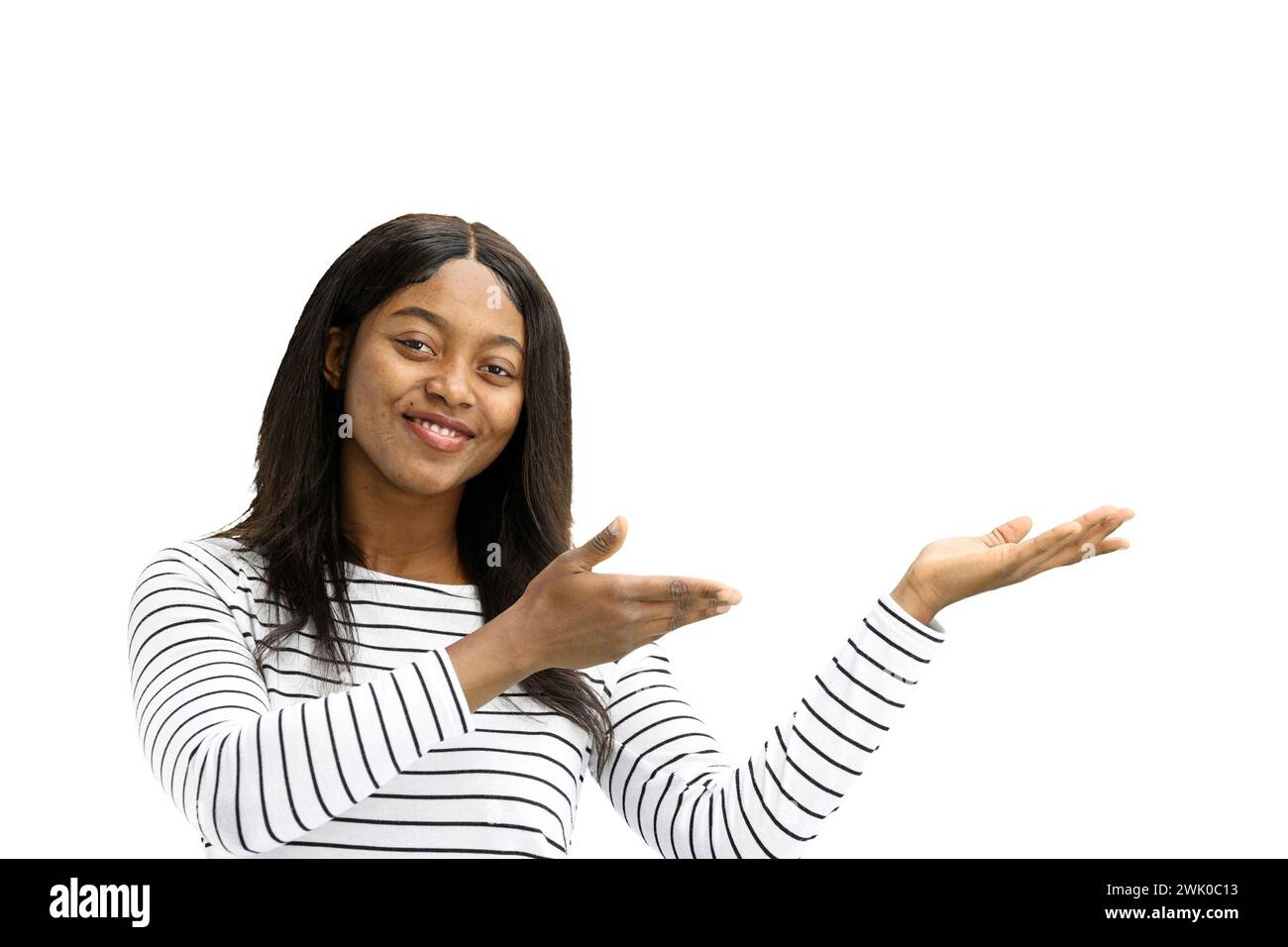 A woman, on a white background, in close-up, points to the side Stock ...