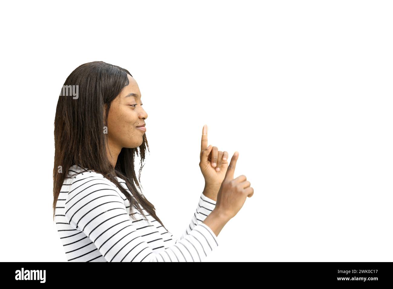 A woman, on a white background, in close-up, points to the side Stock ...