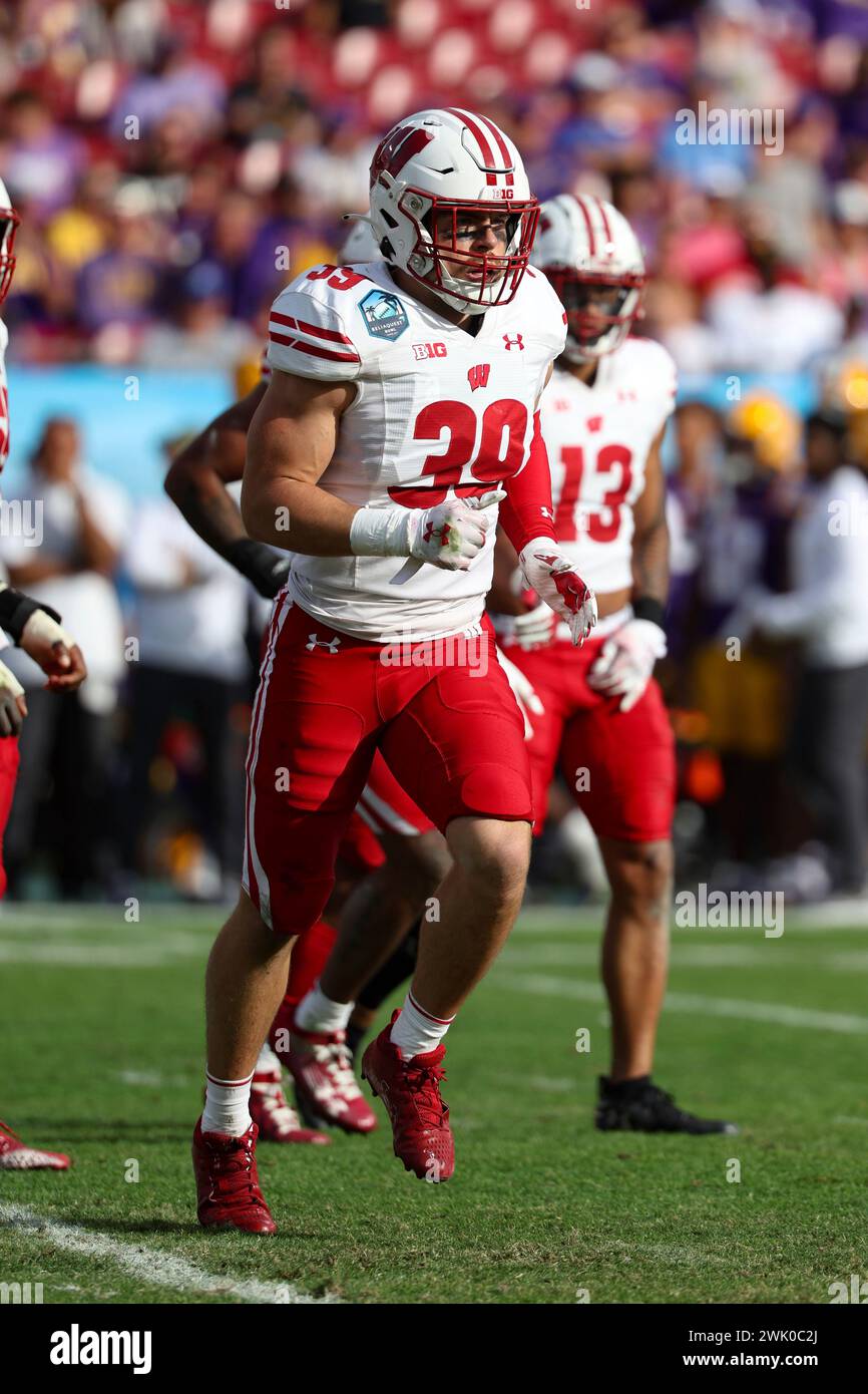 Wisconsin Badgers linebacker Tatum Grass (39) runs onto the field ...