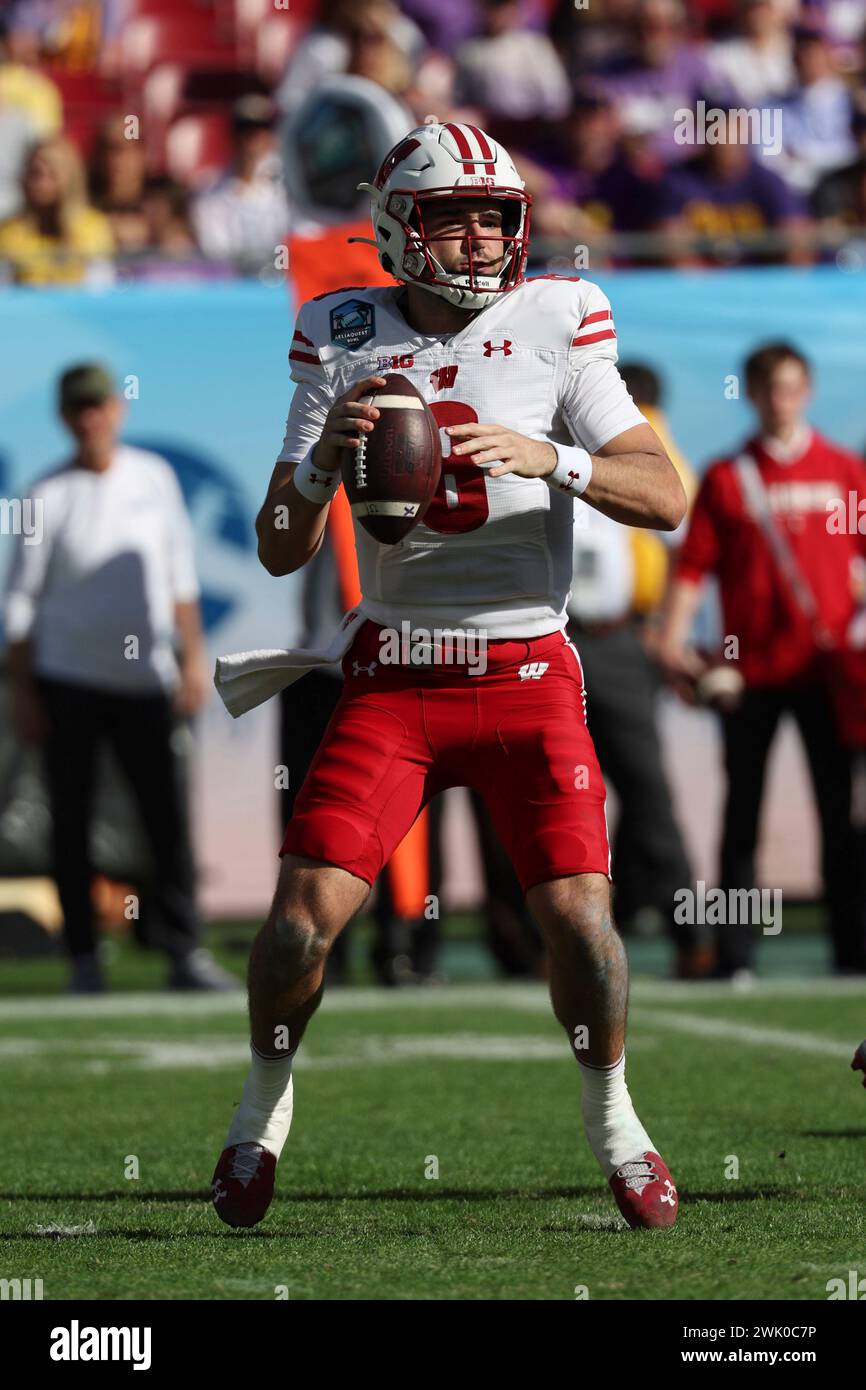 Wisconsin Badgers quarterback Tanner Mordecai (8) looks downfield for a ...