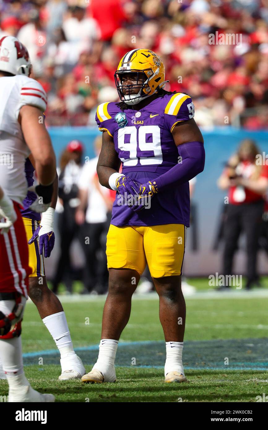 LSU Tigers defensive tackle Jordan Jefferson (99) takes a break during ...