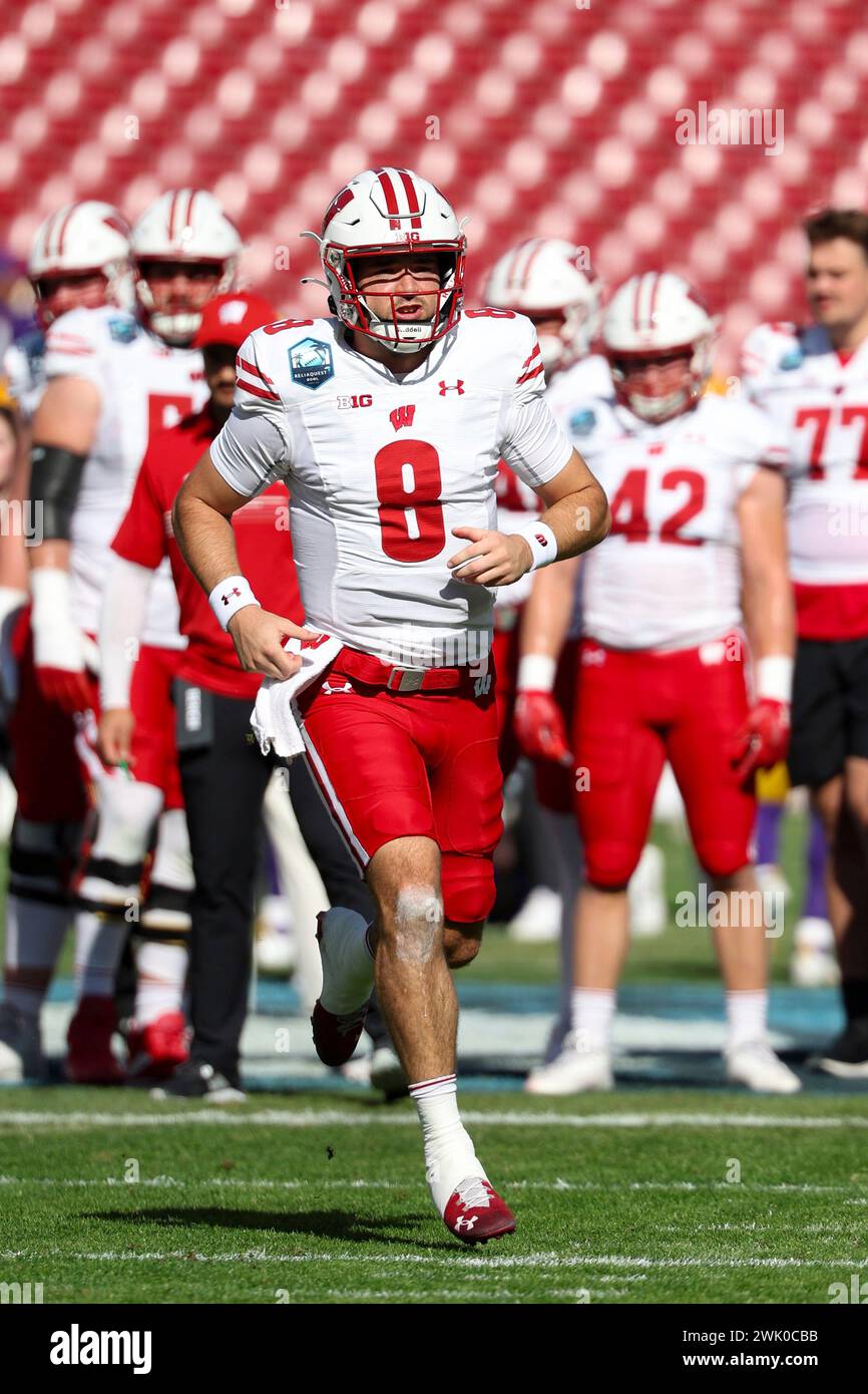 Wisconsin Badgers quarterback Tanner Mordecai (8) runs onto the field ...