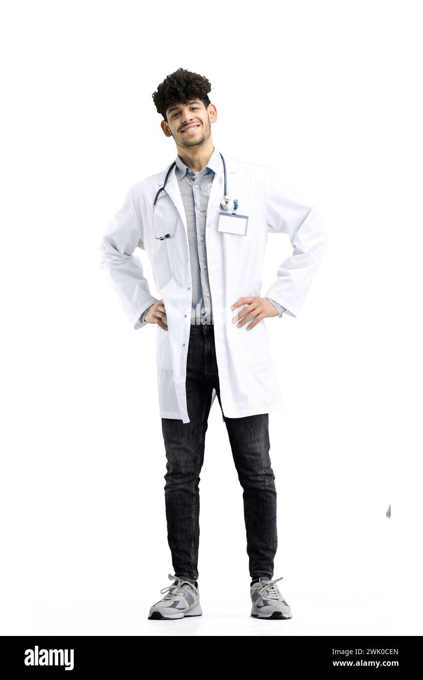 Male doctor, full-length, on a white background, hands on hips Stock ...