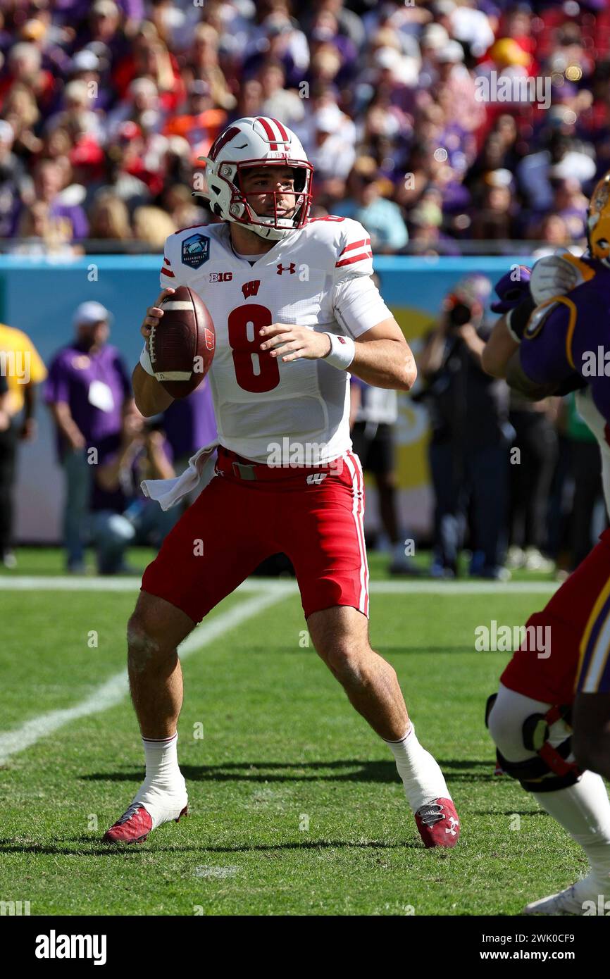 Wisconsin Badgers quarterback Tanner Mordecai (8) looks downfield for a ...