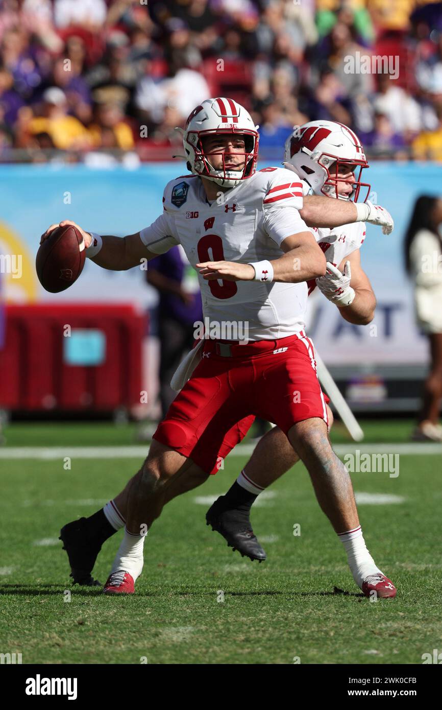 Wisconsin Badgers quarterback Tanner Mordecai (8) passes the ball in ... Wisconsin Badgers quarterback Tanner Mordecai (8) passes the ball in ...