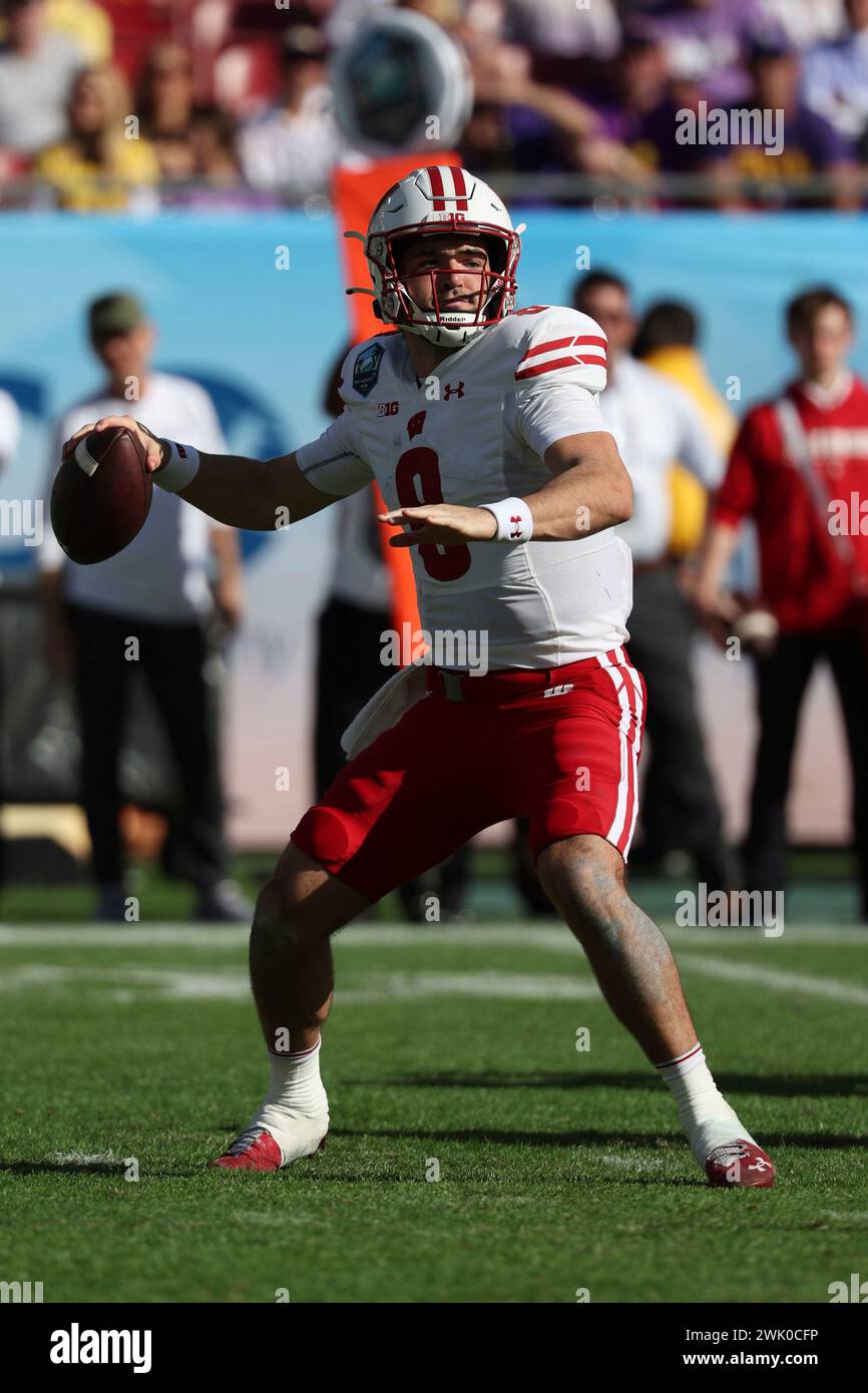 Wisconsin Badgers quarterback Tanner Mordecai (8) passes the ball in ... Wisconsin Badgers quarterback Tanner Mordecai (8) passes the ball in ...