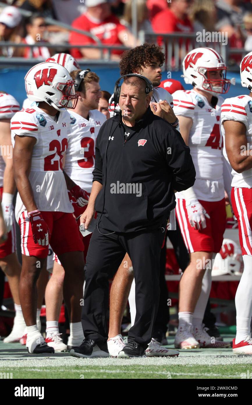 Wisconsin Badgers offensive coordinator, Phil Longo watches from the ...