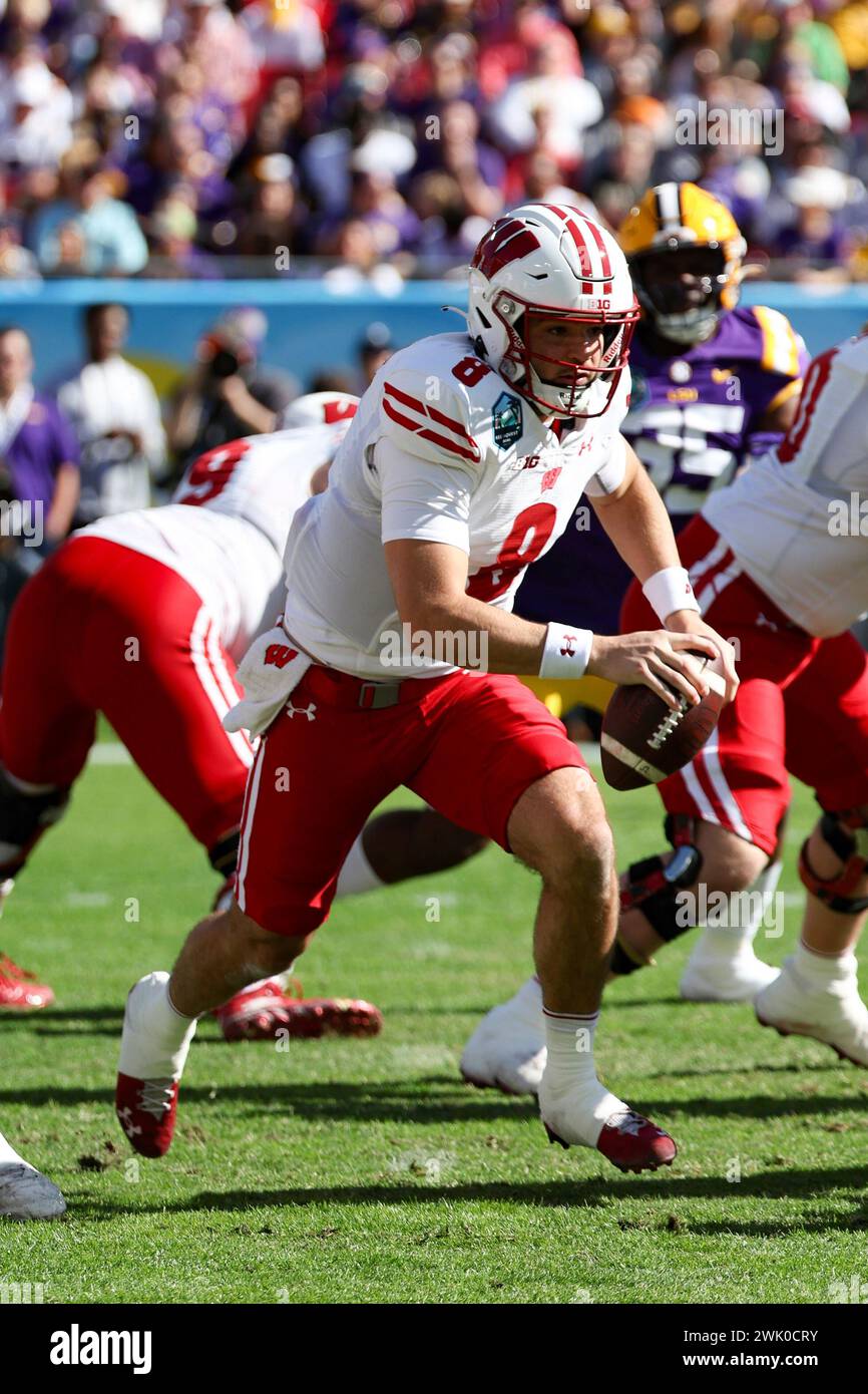 Wisconsin Badgers quarterback Tanner Mordecai (8) runs with the ball in ...