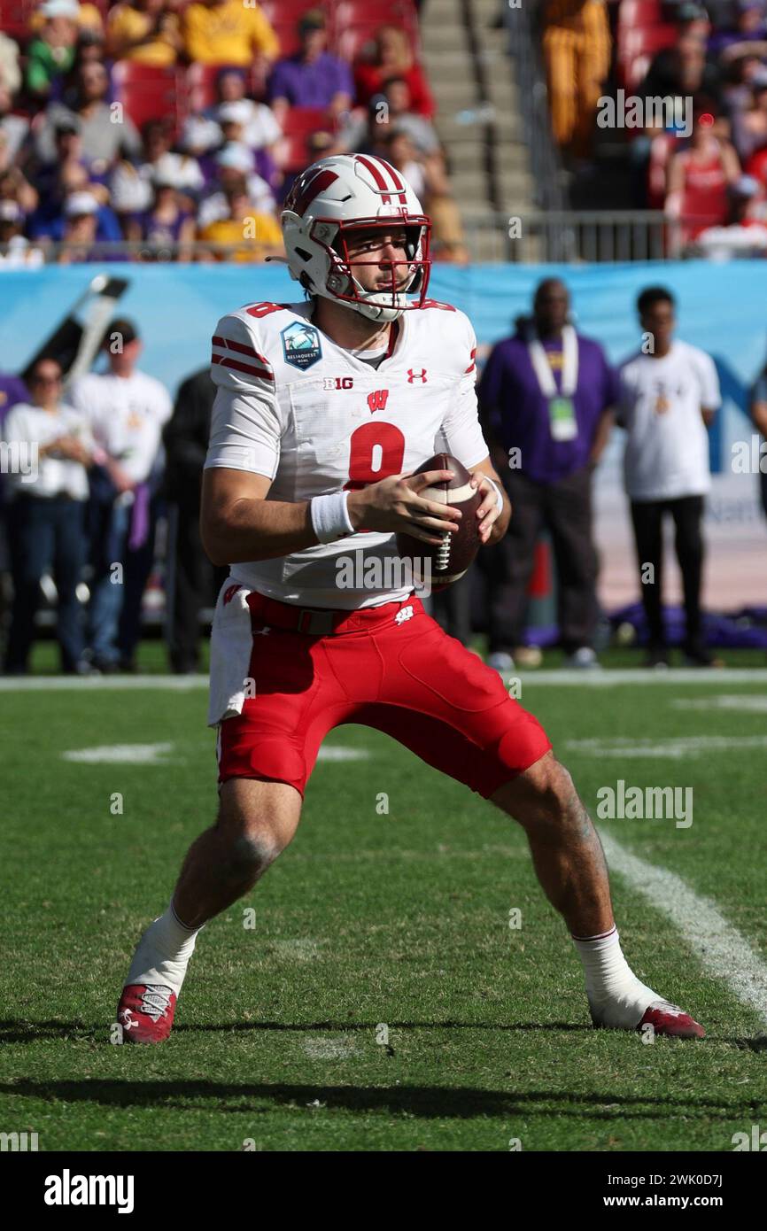 Wisconsin Badgers quarterback Tanner Mordecai (8) looks downfield for a ...