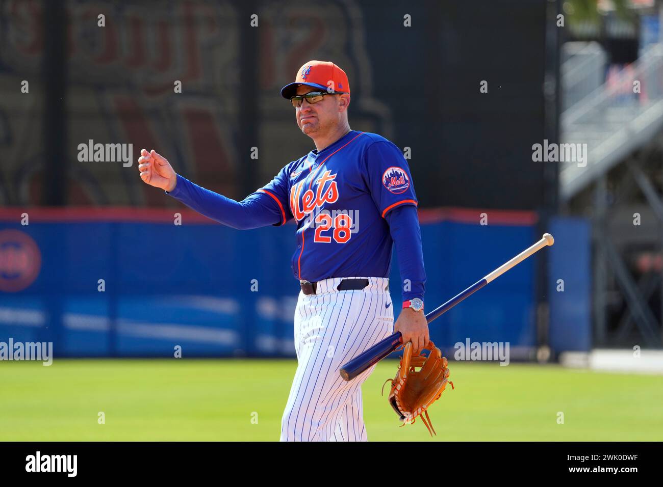 New York Mets manager Carlos Mendoza roams the practice field during a ...