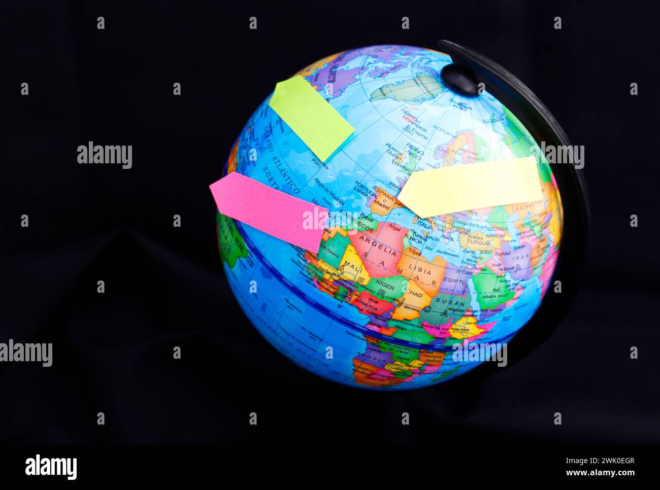Planet Earth marking three geographic locations (texts in Spanish Stock ...