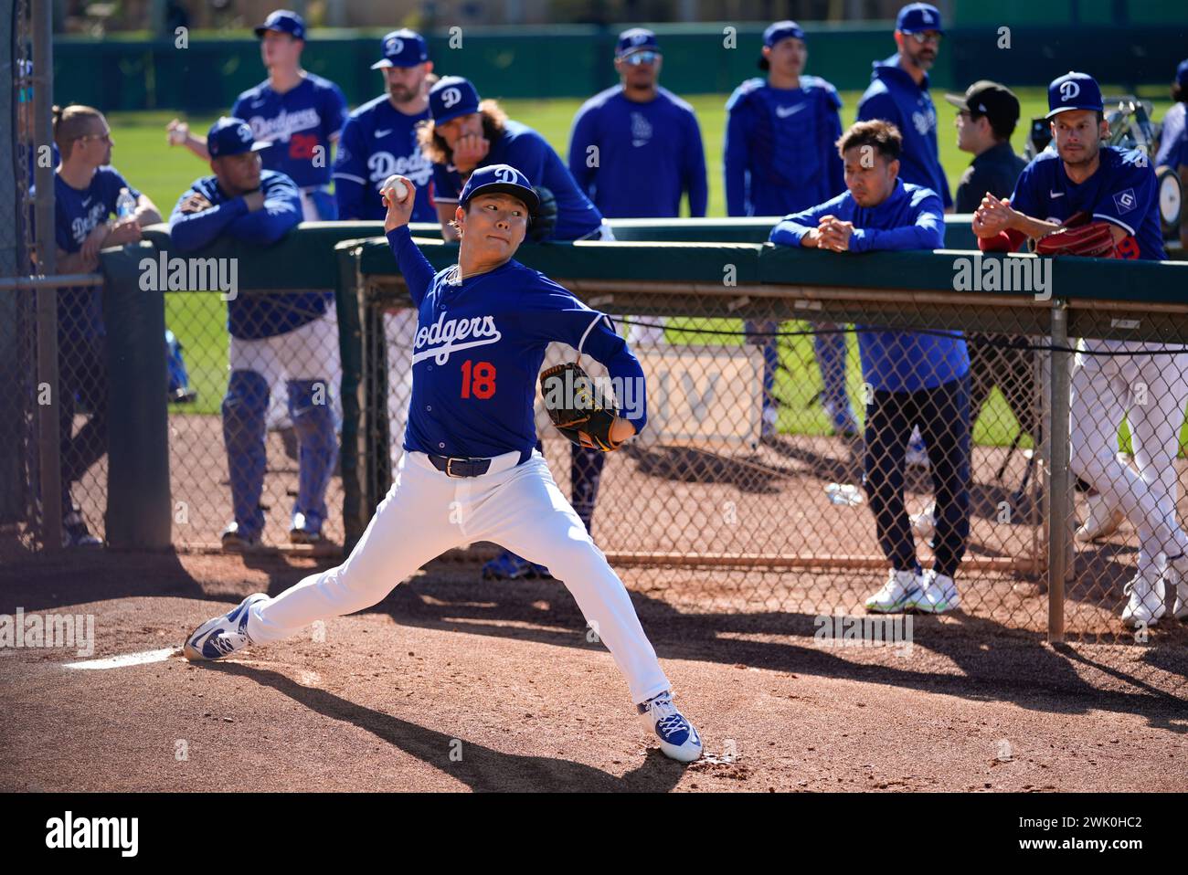 Los Angeles Dodgers pitcher Yoshinobu Yamamoto (18) throws in the ...