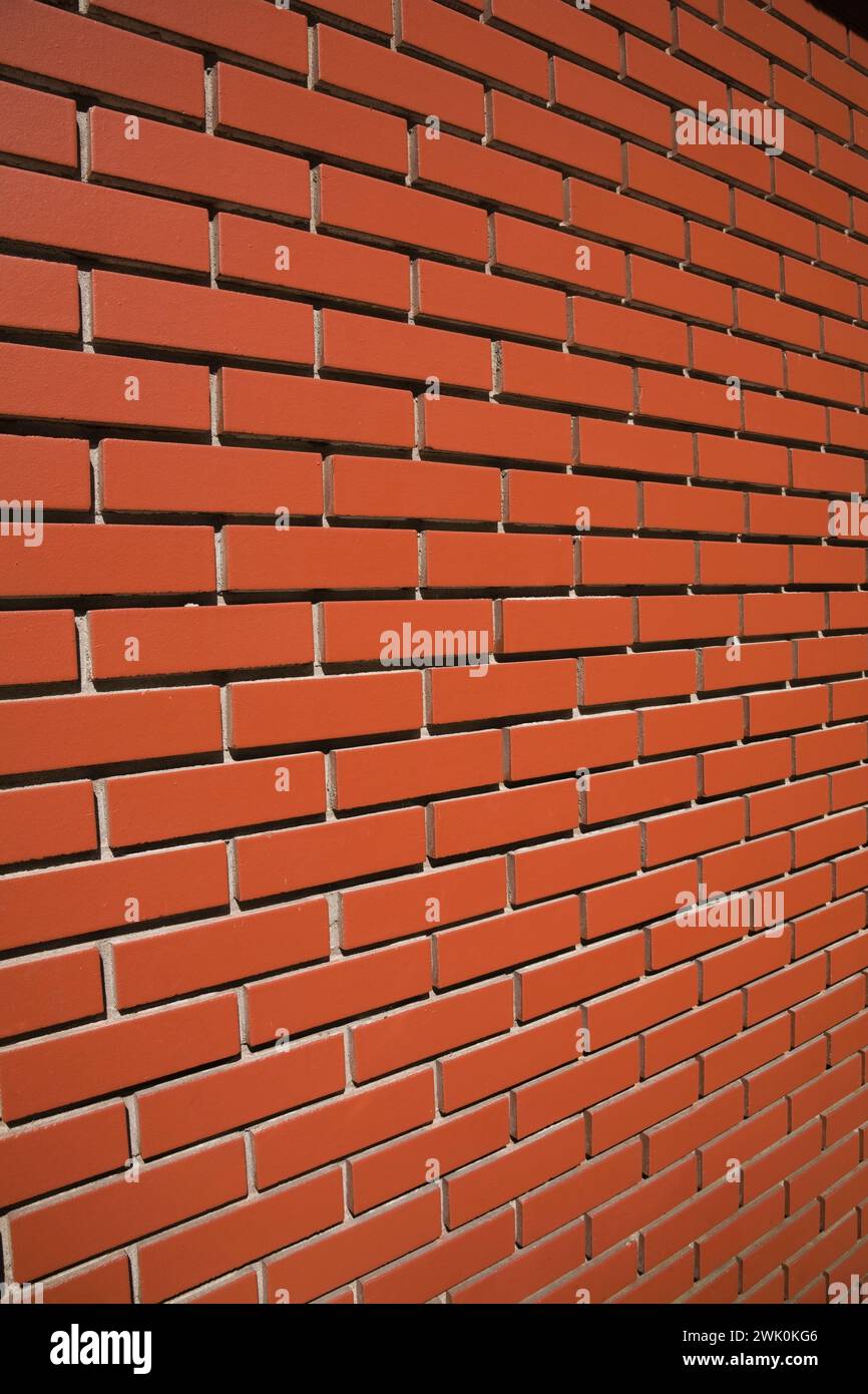 Close-up of brick wall with red rectangular bricks Stock Photo - Alamy