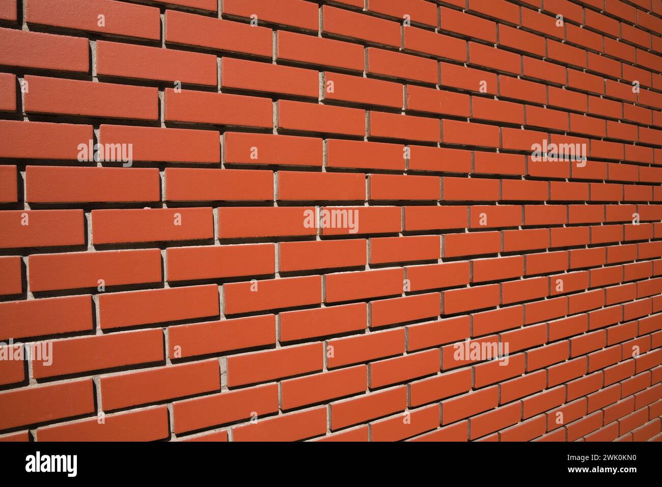 Close-up of brick wall with red rectangular bricks Stock Photo - Alamy