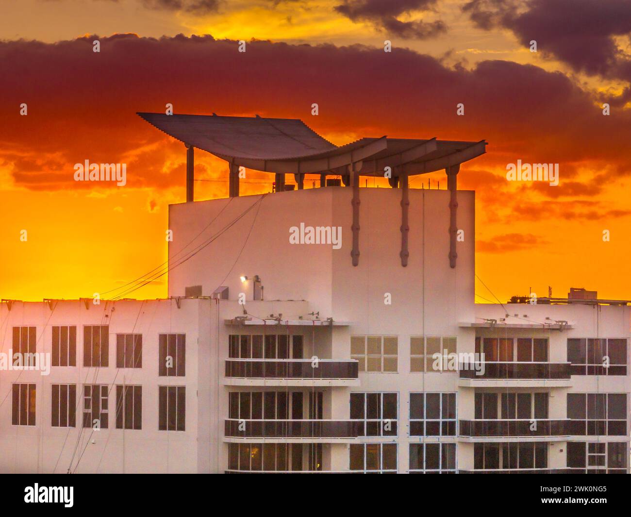 Roof top steel pergola shade structure with stunning sunset colorful ...