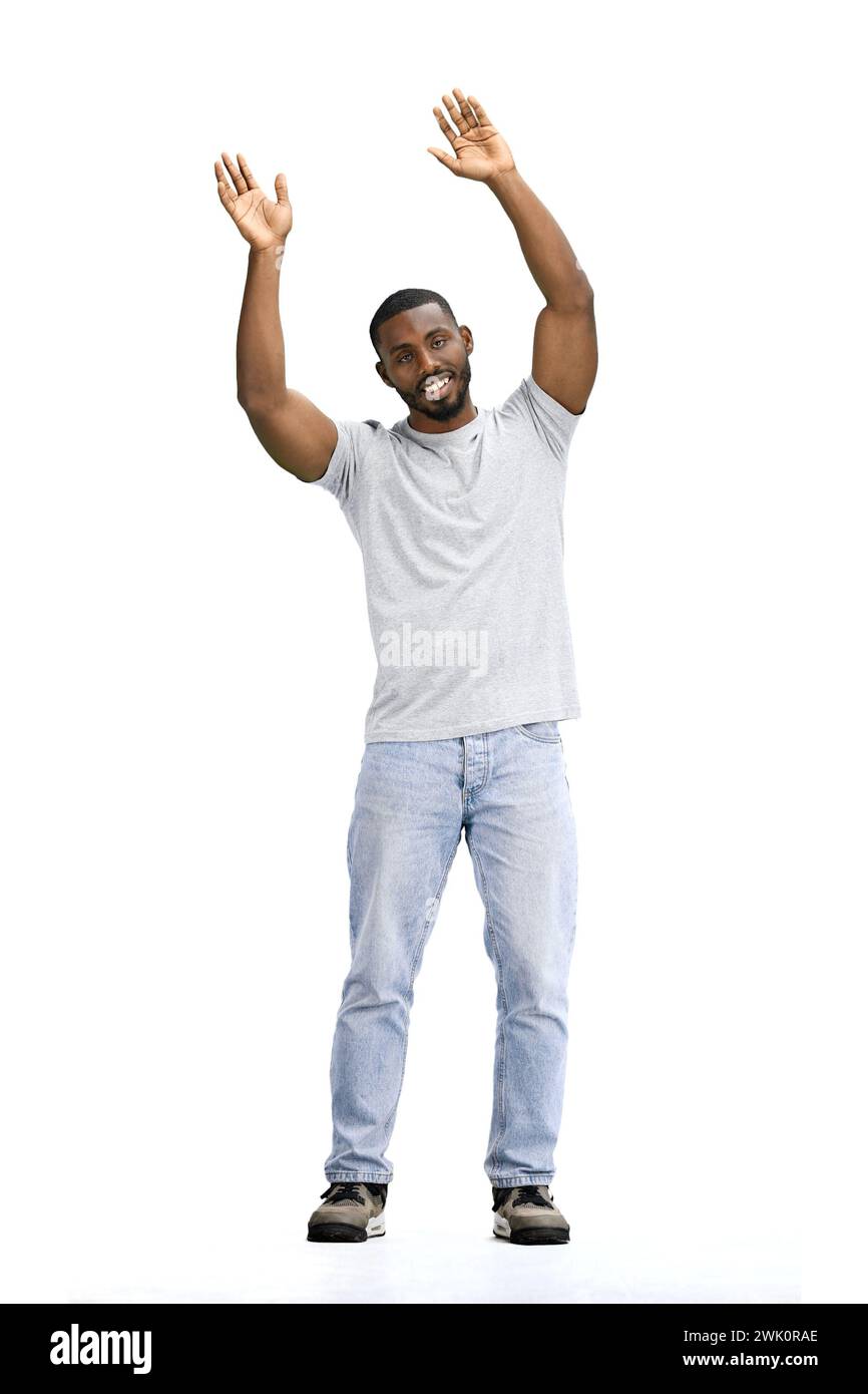 A man, full-length, on a white background, waving his arms Stock Photo ...