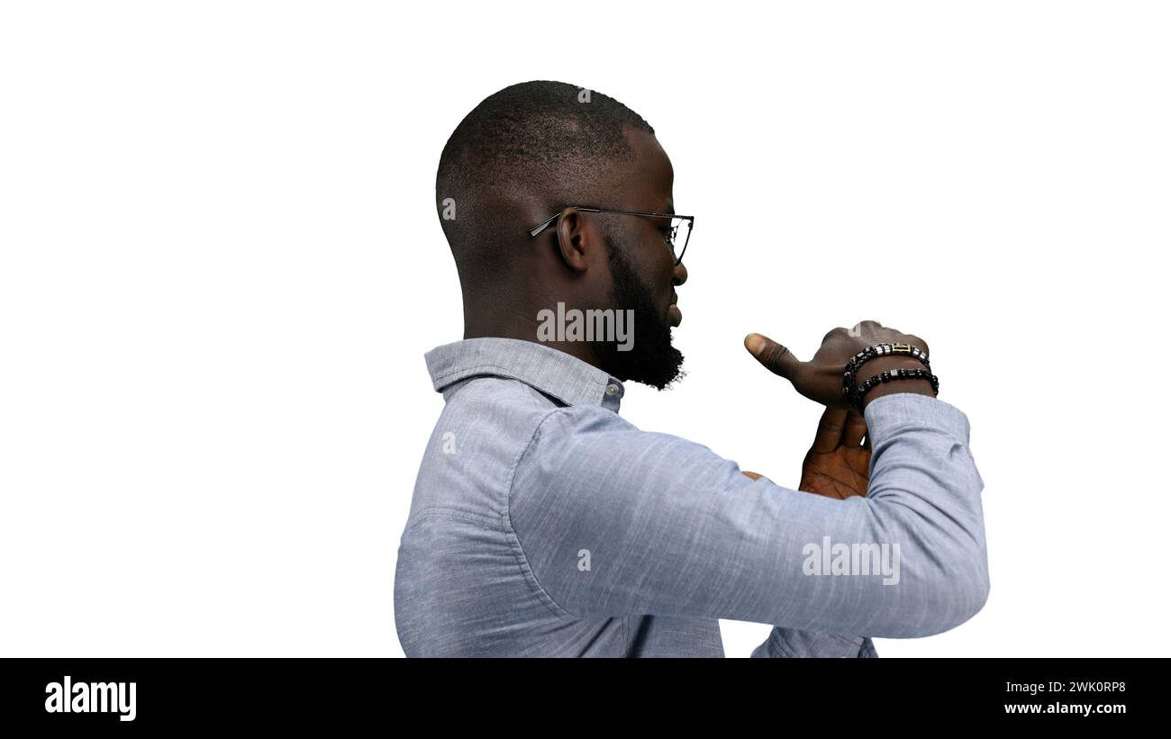 A man, close-up, on a white background, shows a pause sign Stock Photo ...