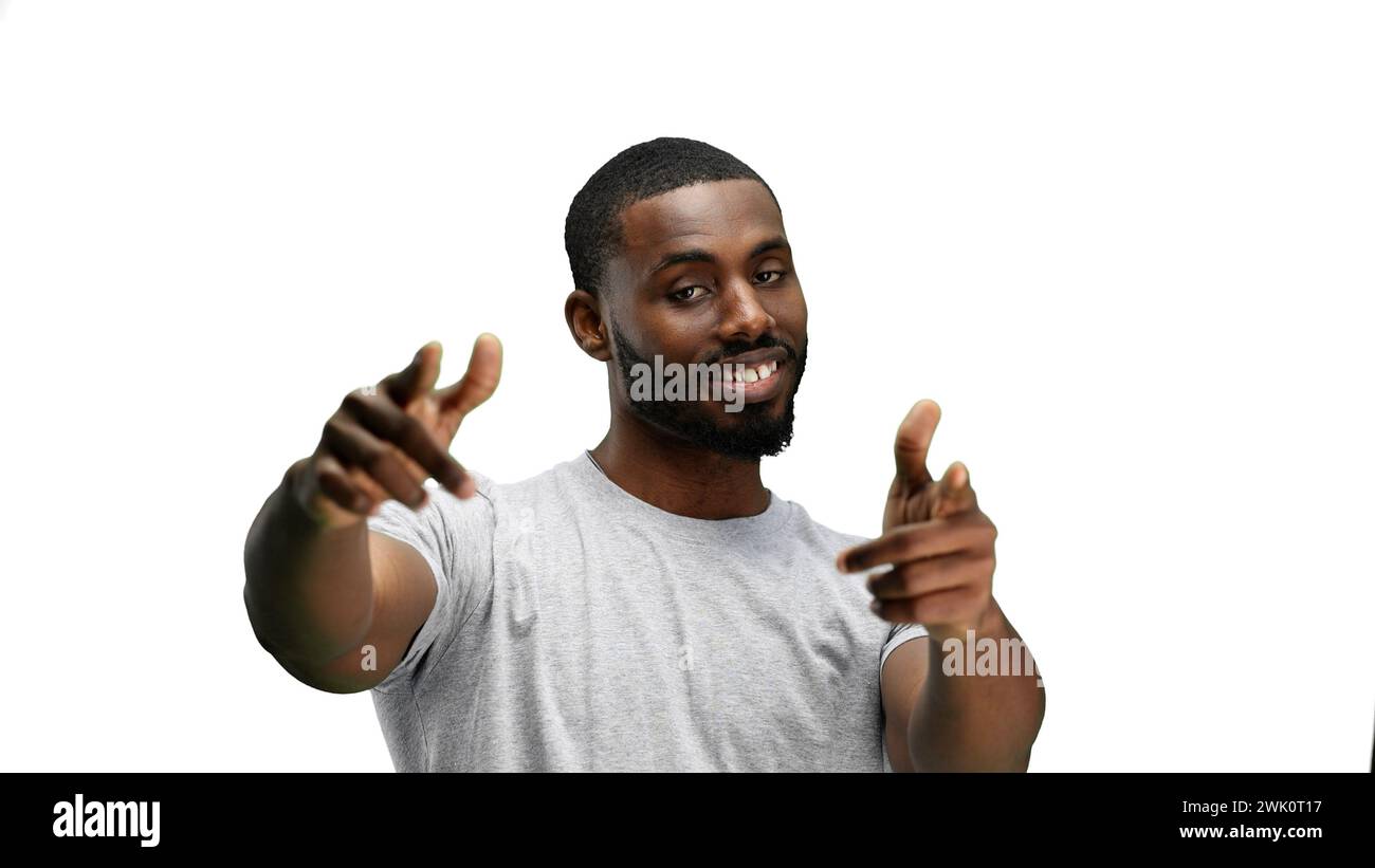 A man, close-up, on a white background, points to the side Stock Photo ...