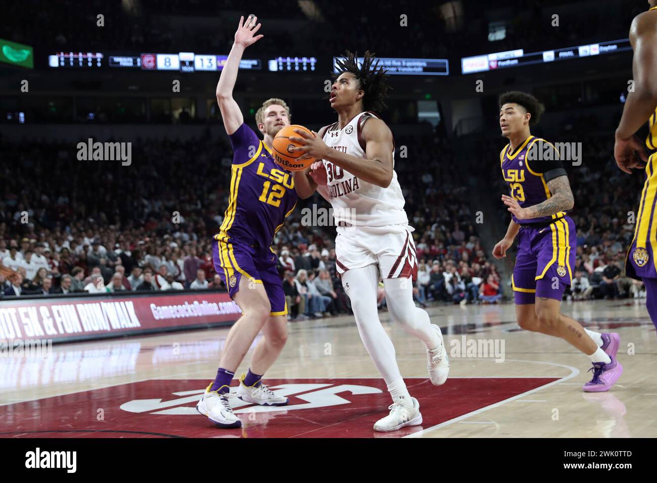 South Carolina forward Collin Murray-Boyles (30) drives past LSU ...