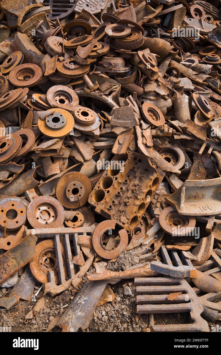 Pile of assorted rusted steel disc and drum brakes at scrap metal ...