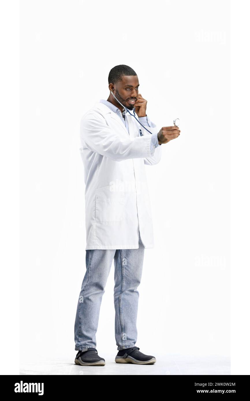 Doctor, full-length, on a white background, with a stethoscope Stock ...