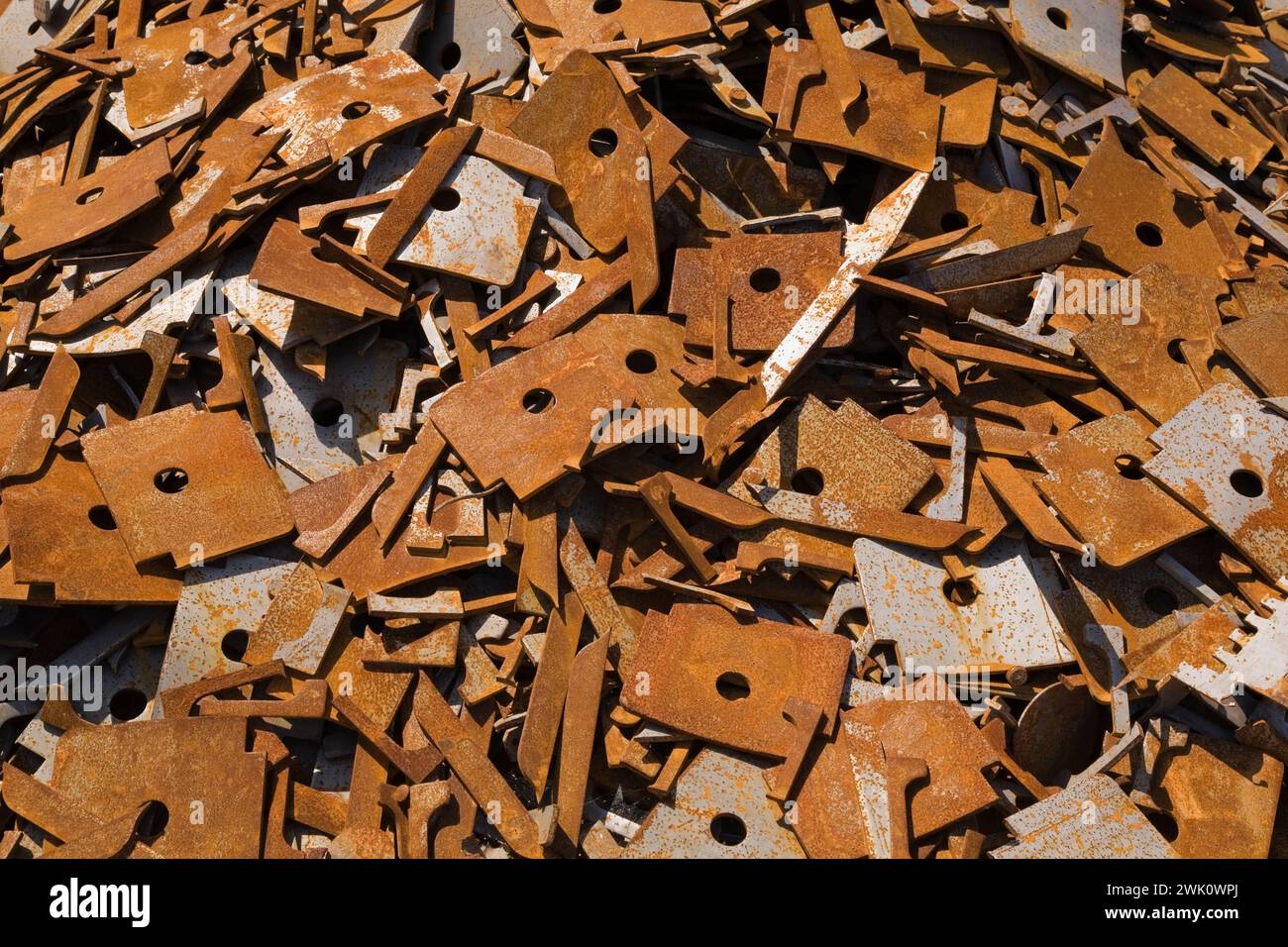 Pile of rusted steel plates in scrap metal recycling yard Stock Photo ...