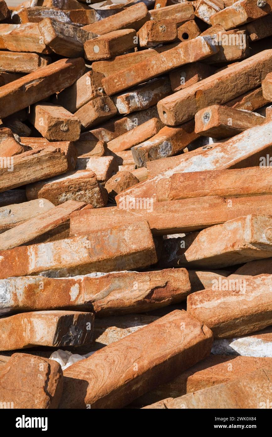Pile of rusted steel beams at scrap metal recycling yard Stock Photo ...
