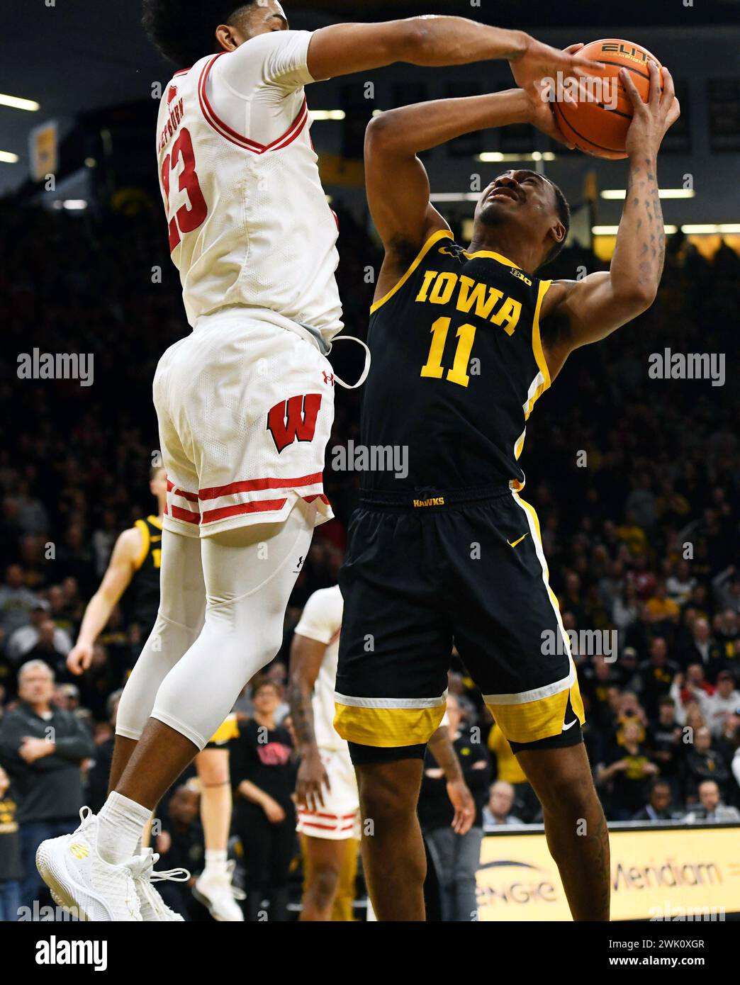 Iowa guard Tony Perkins (11) makes the game winning basket under ...
