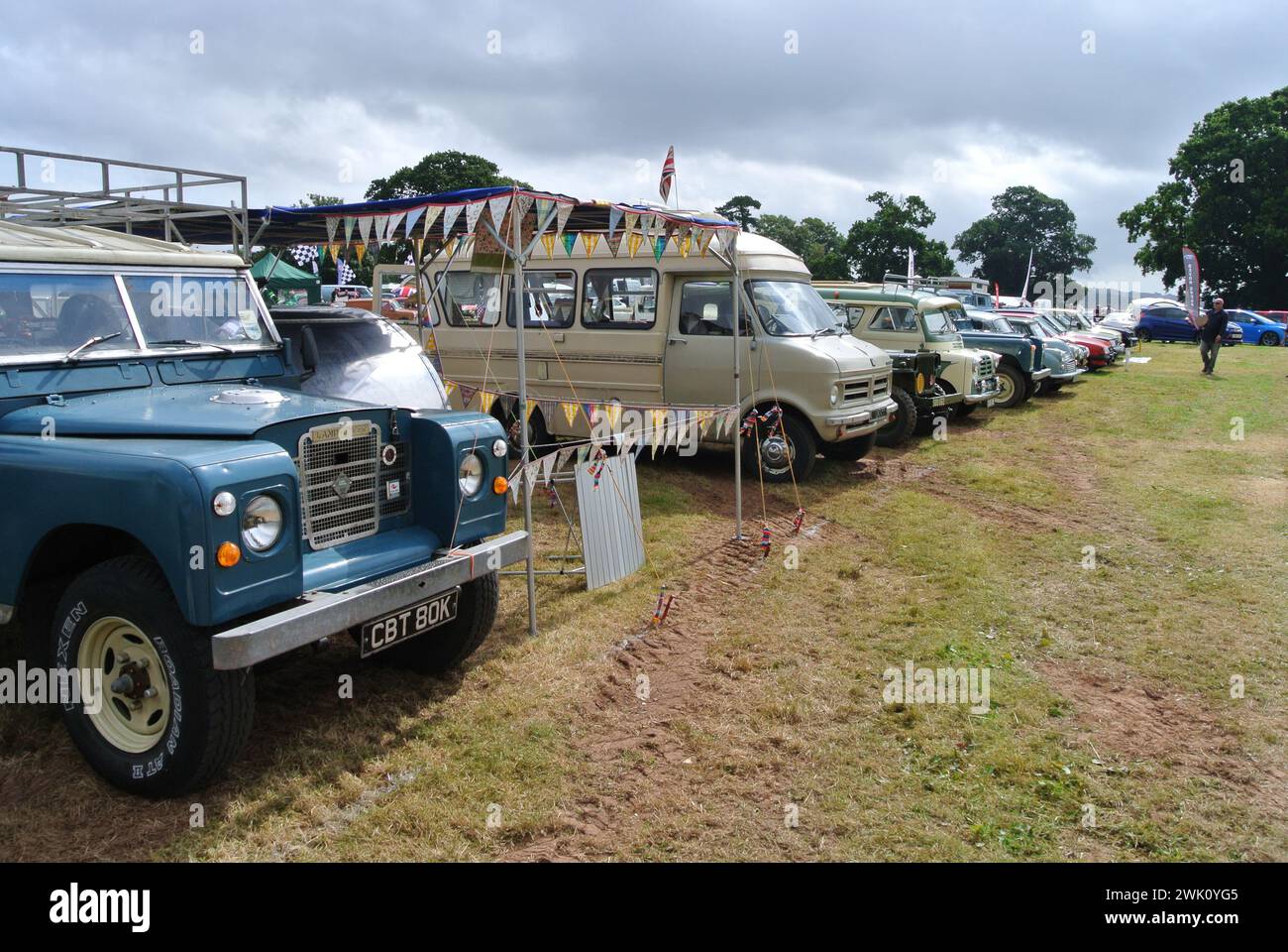 A line of classic vehicles parked on display at the 48th Historic ...