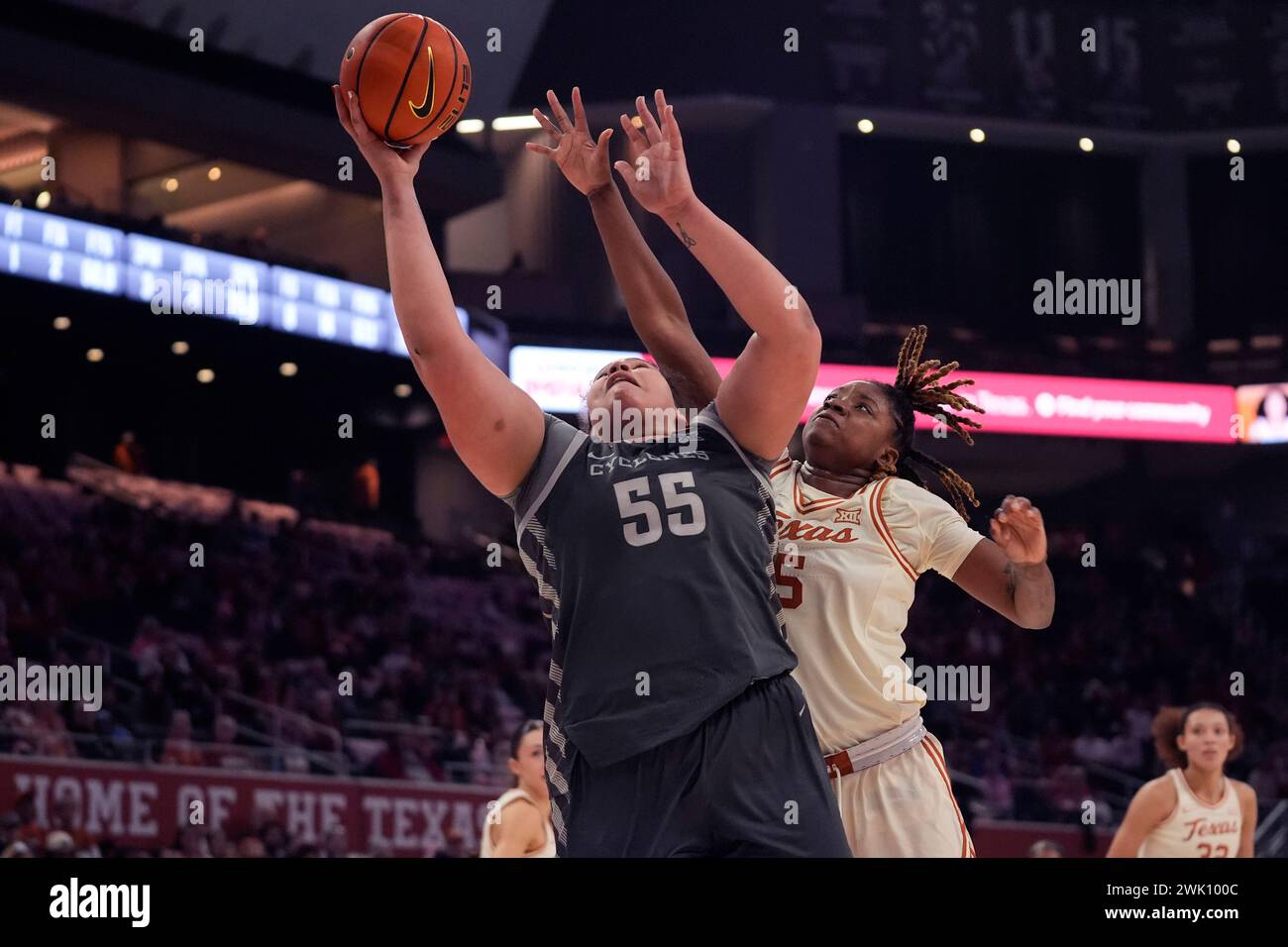 Iowa State center Audi Crooks (55) shoots past Texas forward DeYona ...