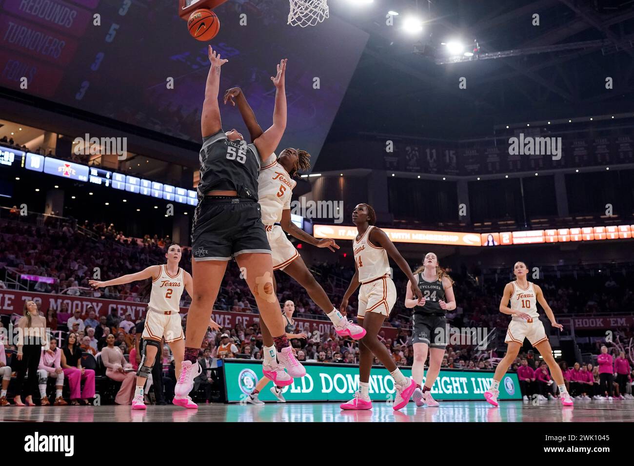 Iowa State center Audi Crooks (55) shoots past Texas forward DeYona ...